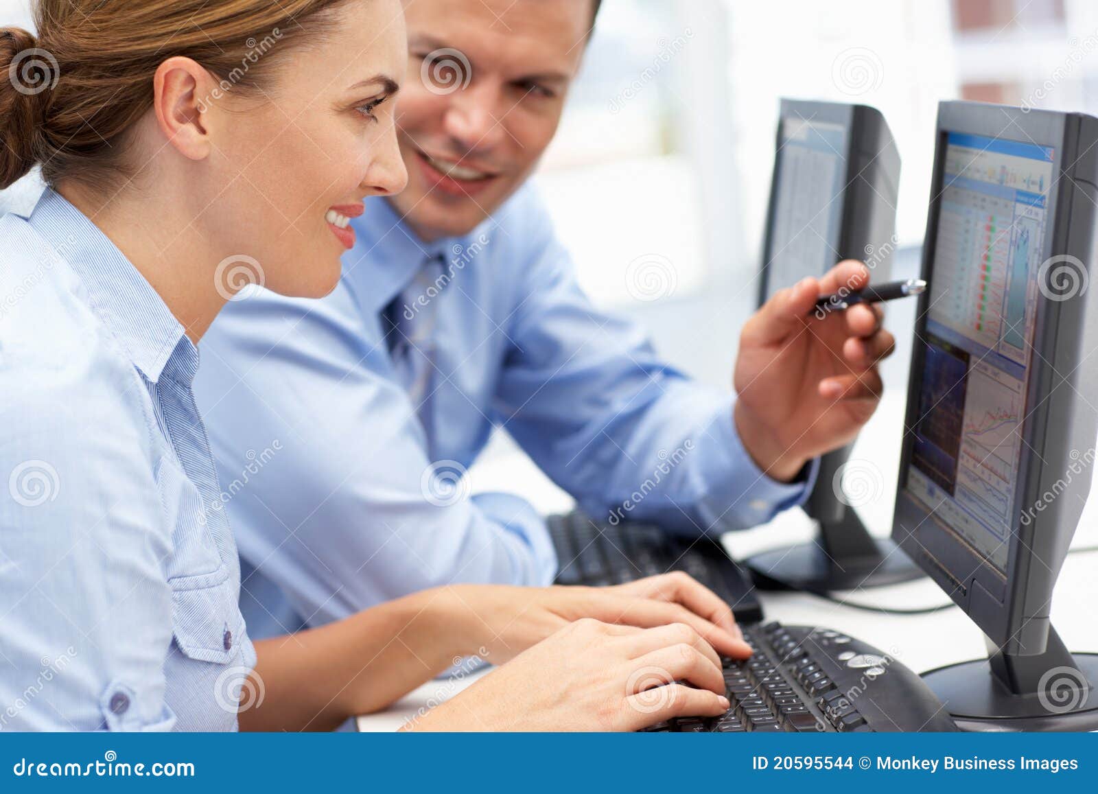 Business Man and Woman Working on Computers Stock Photo - Image of ...