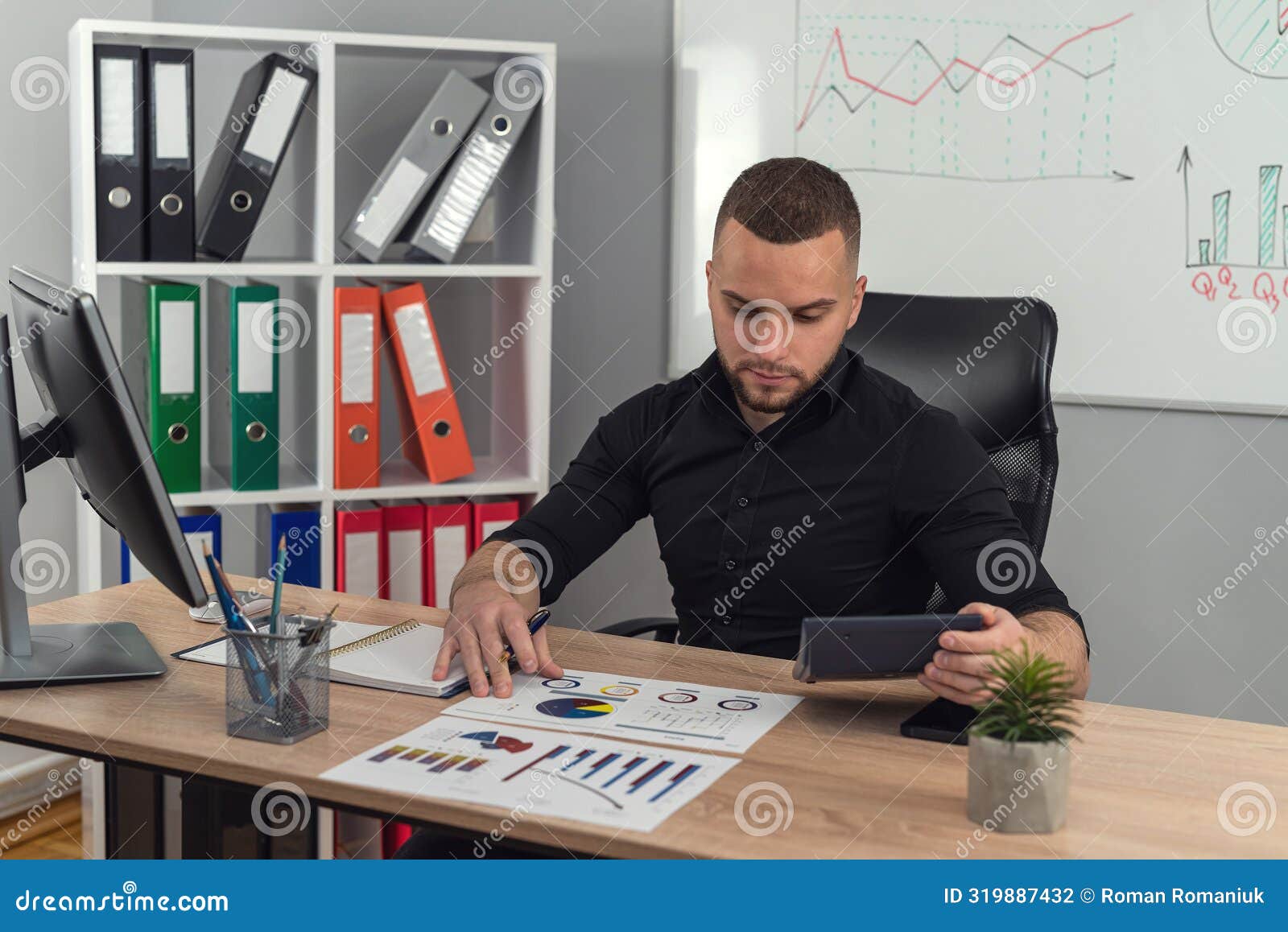 Business Man Work with Charts and Graphs with Computer at Modern Office ...