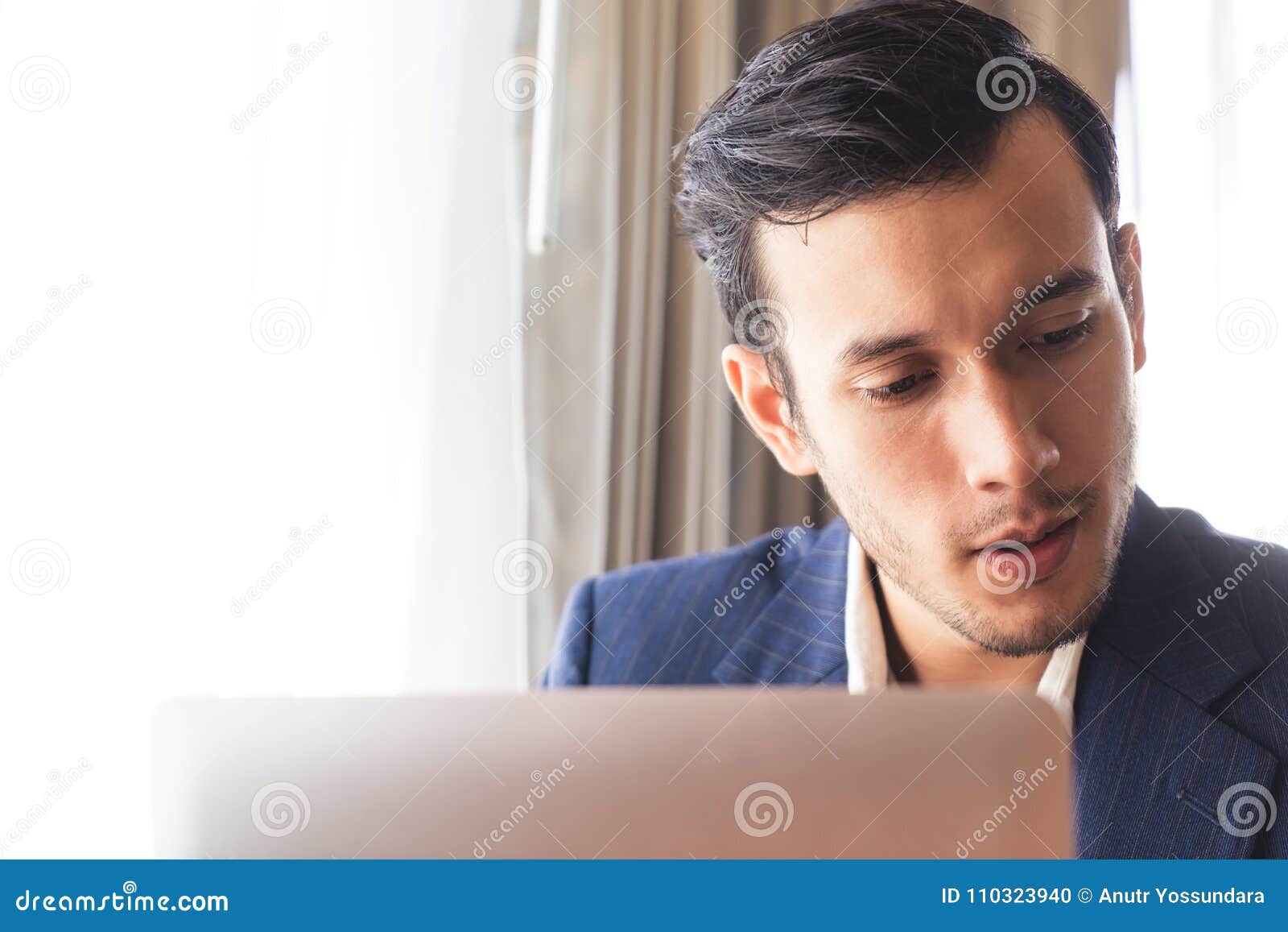Business Man Working on Computer on the Desk by the Windows Stock Photo ...