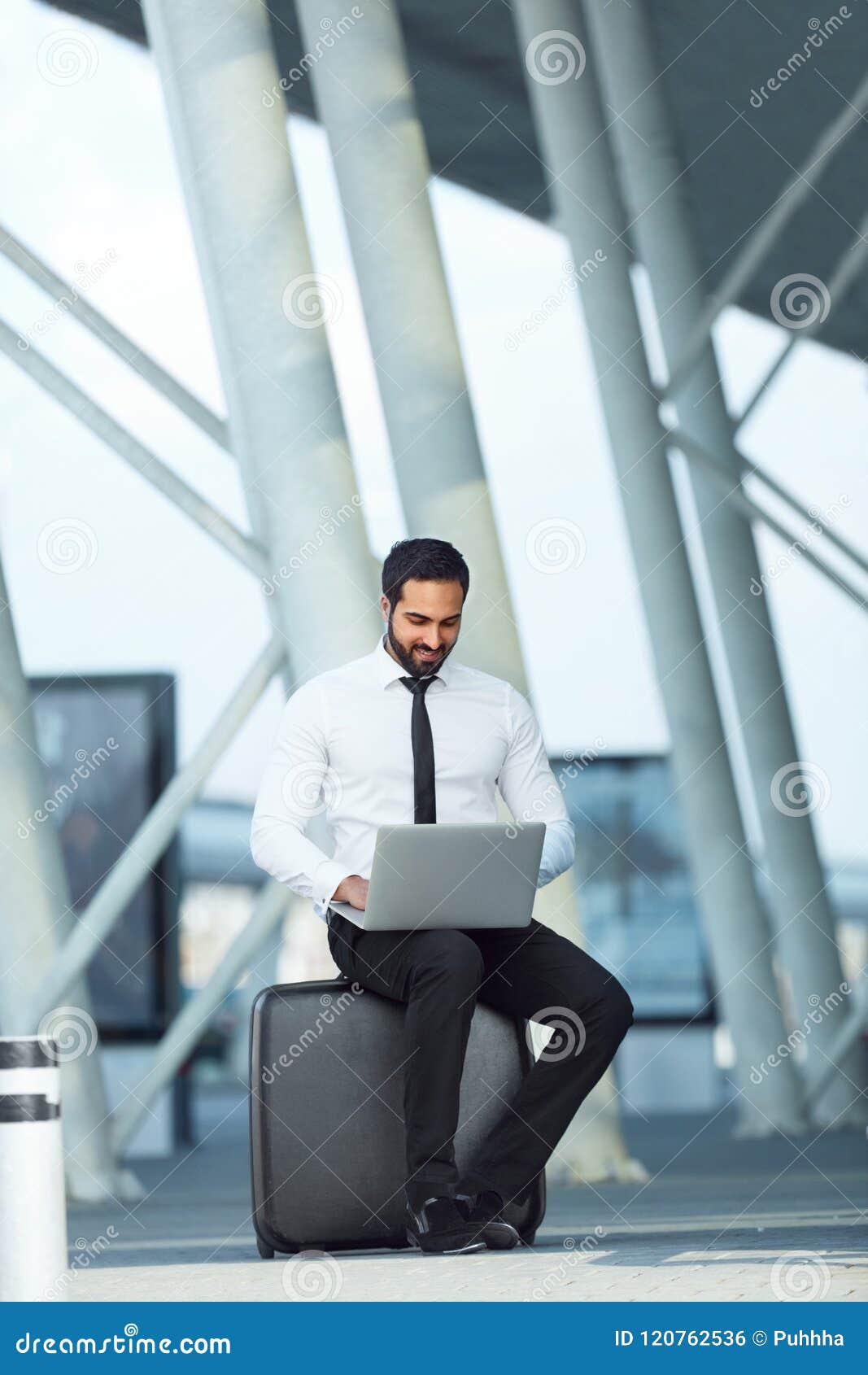 Business Man Working on Computer Traveling at Airport Stock Photo ...
