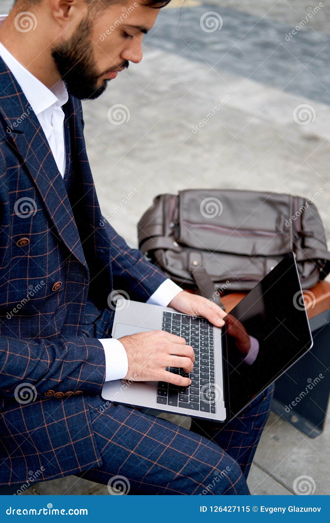Business Man Working on Laptop Computer. Man in Business Suit on ...