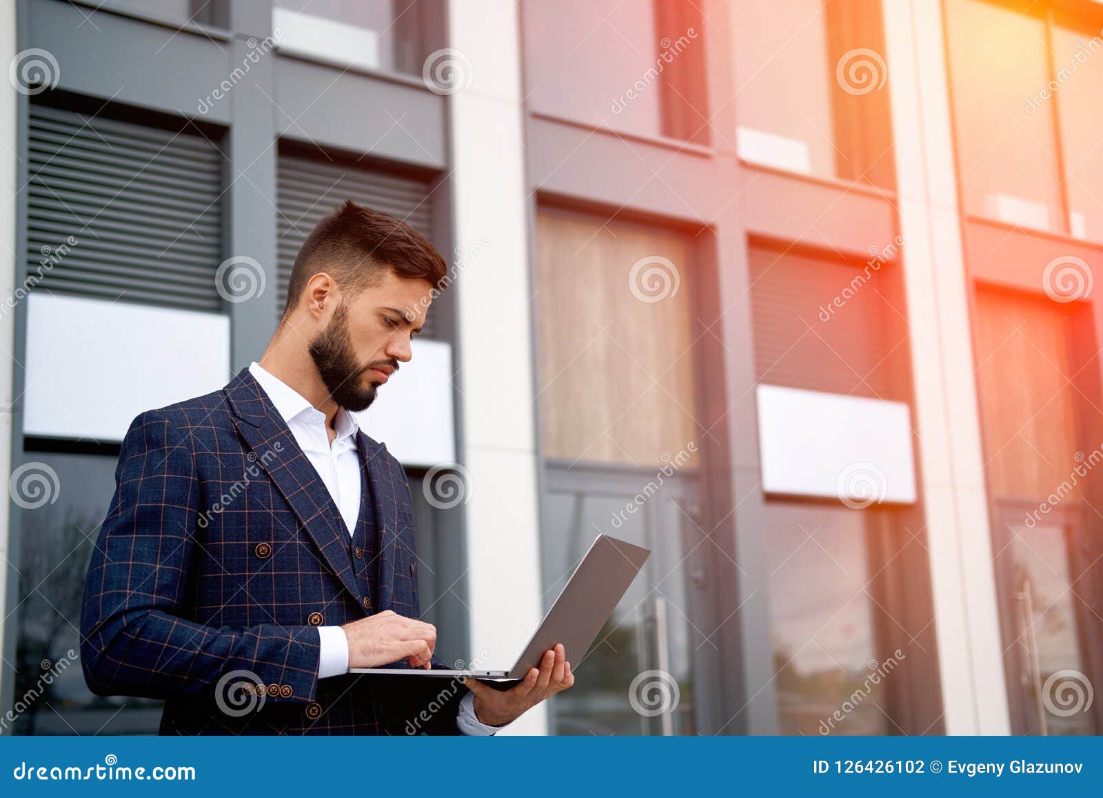 Business Man Working on Laptop Computer. Man in Business Suit on ...