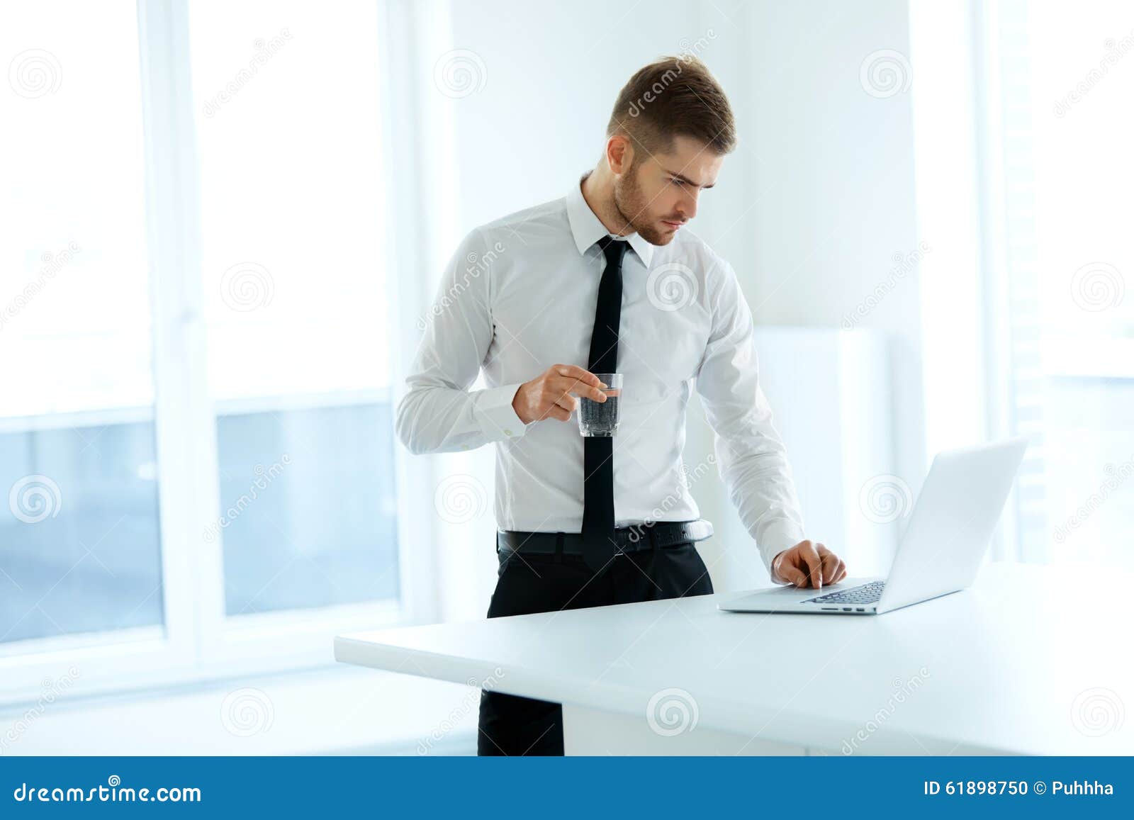 Business Man Works on His Computer at the Office Stock Photo - Image of ...