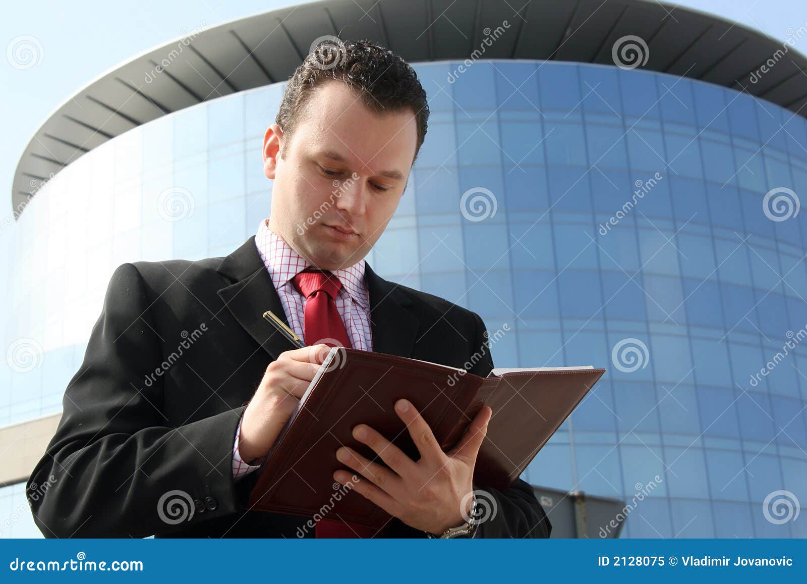 Business man writing stock image. Image of masculine, serious - 2128075