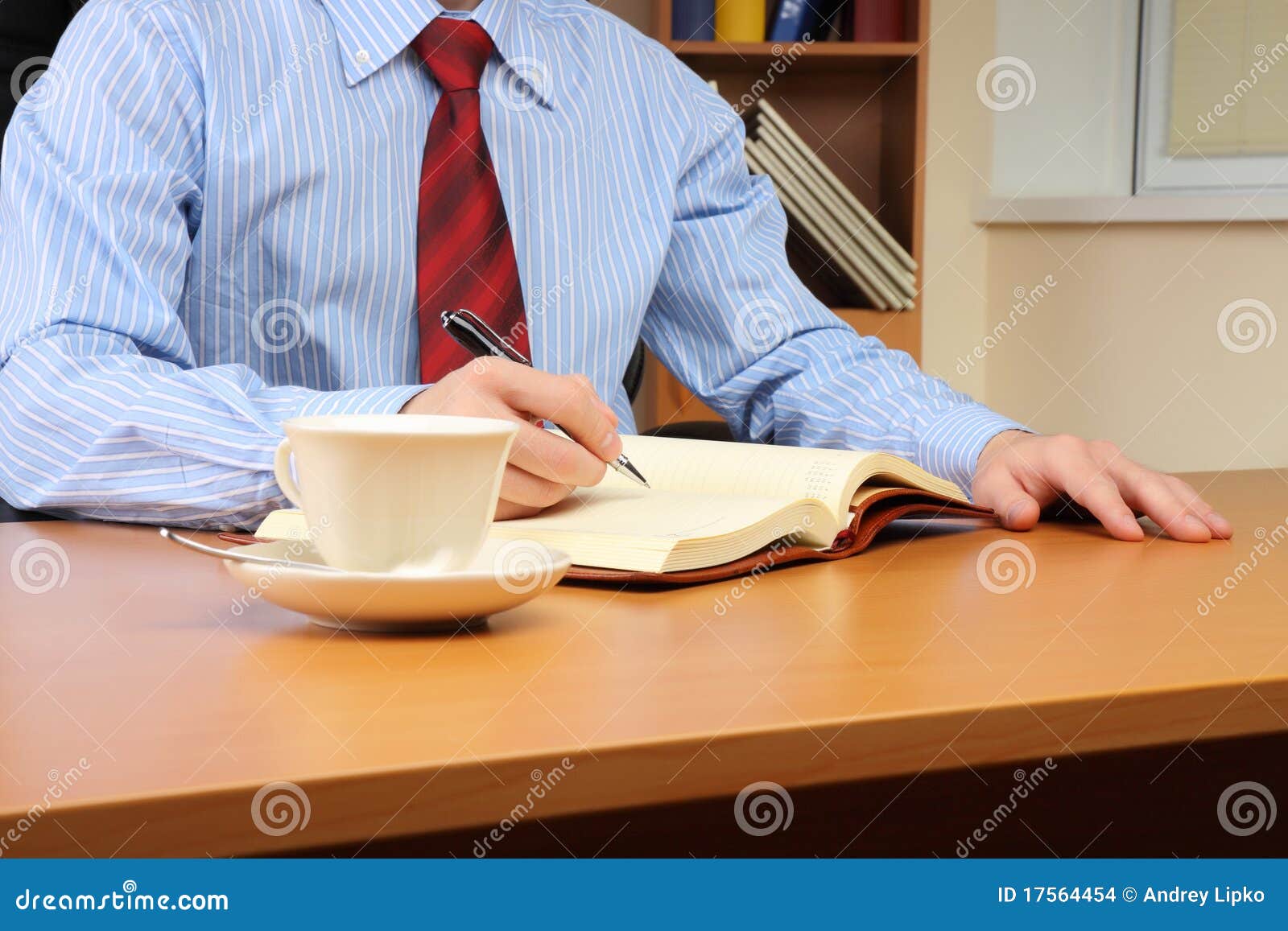 Business Man Writing a Note at His Stock Photo - Image of interior ...
