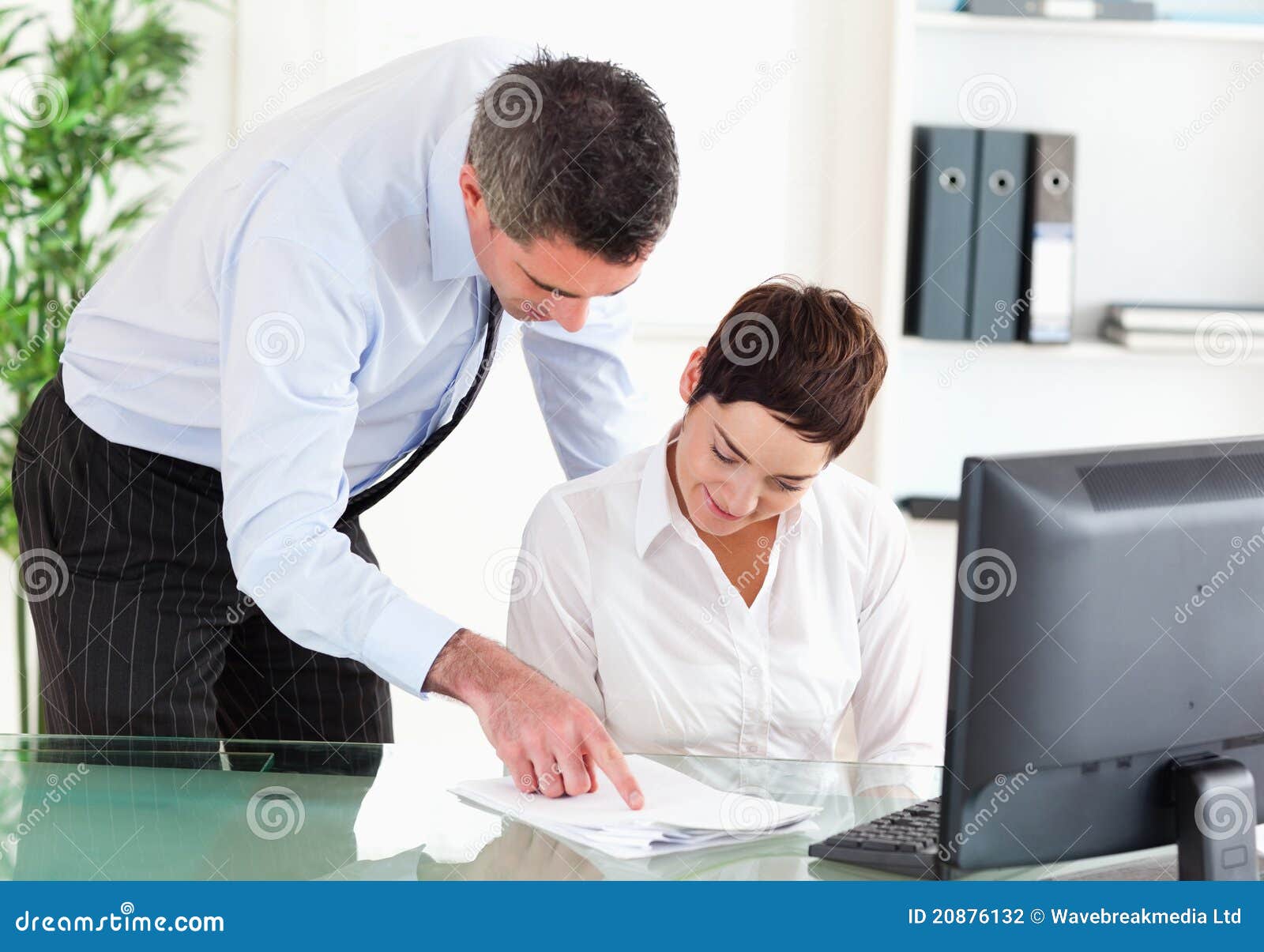 Business Manager Showing Something on a Document Stock Photo - Image of ...