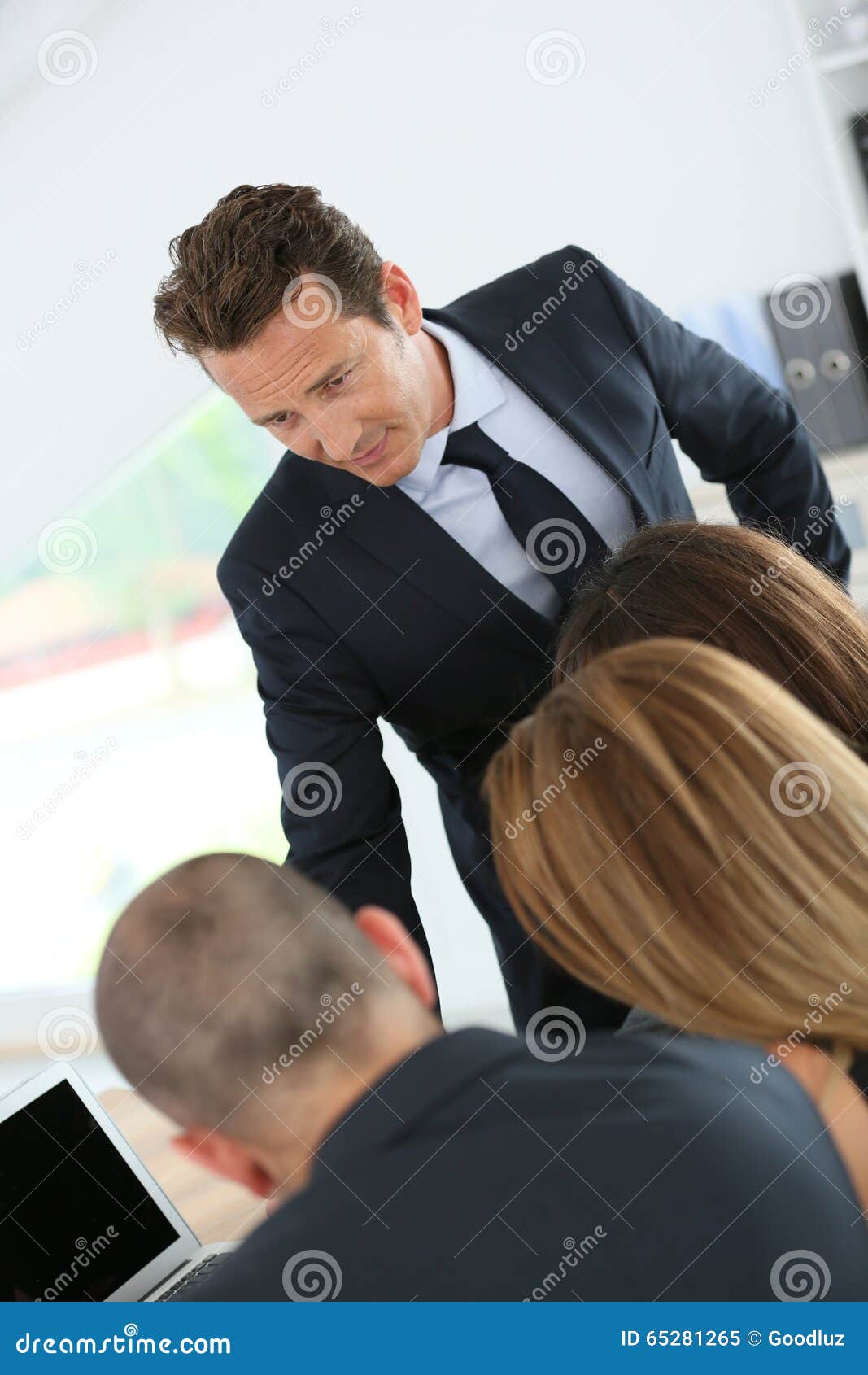 Business manager with team stock image. Image of office - 65281265