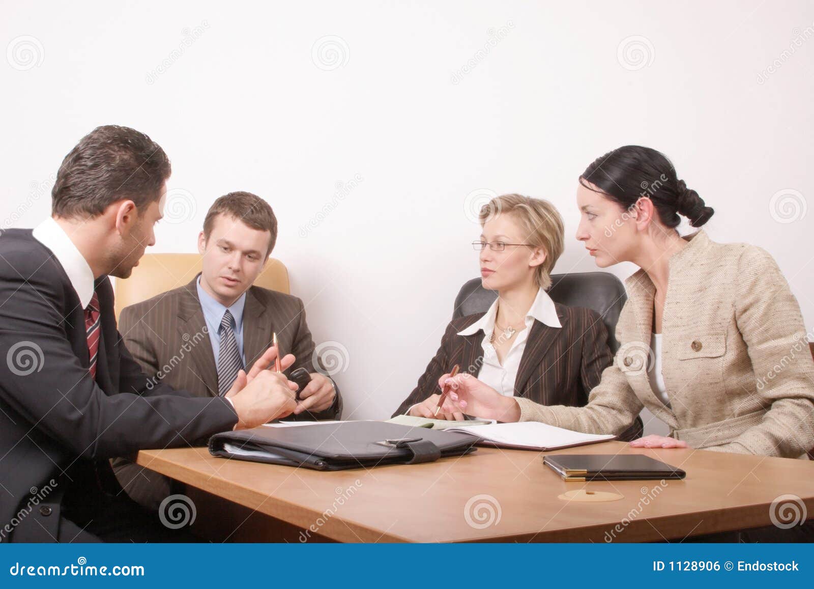 Business Meeting of 4 Persons Stock Photo - Image of community, clothes ...