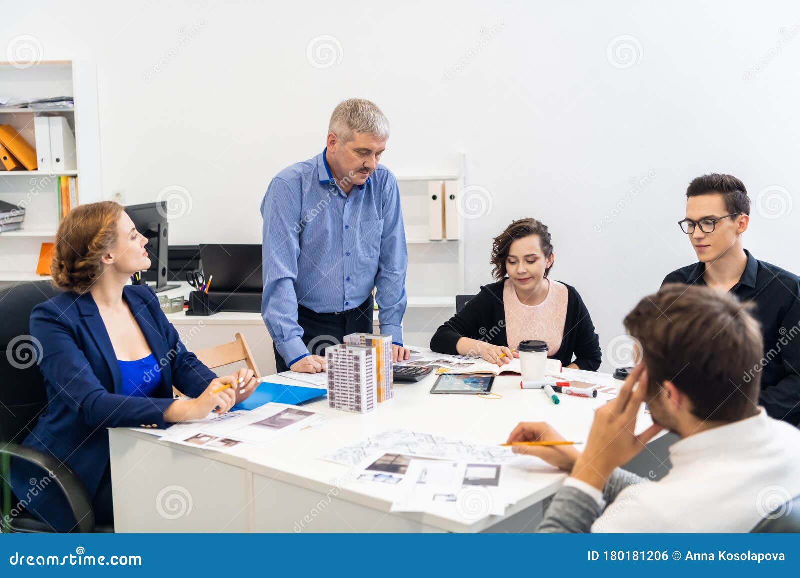 A Business Meeting with an Executive in His Office, the Team are ...