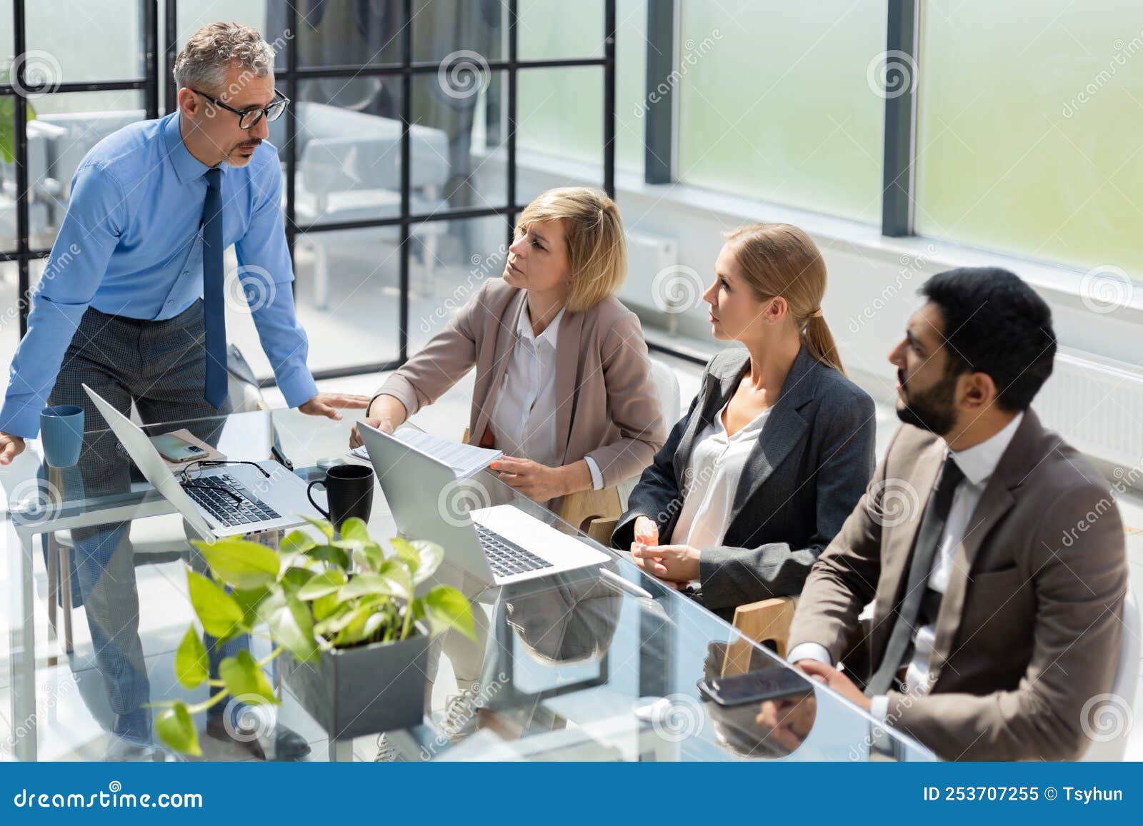 Business Meeting - Manager Discussing Work with His Colleagues. Stock ...
