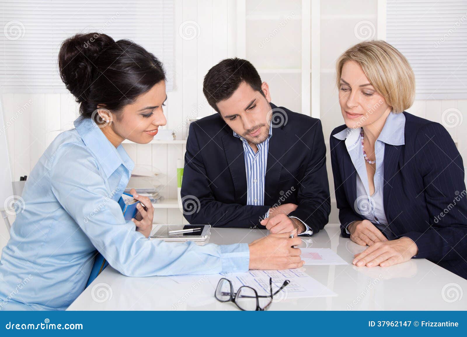 Business Meeting at Office with Three Business People. Stock Image ...
