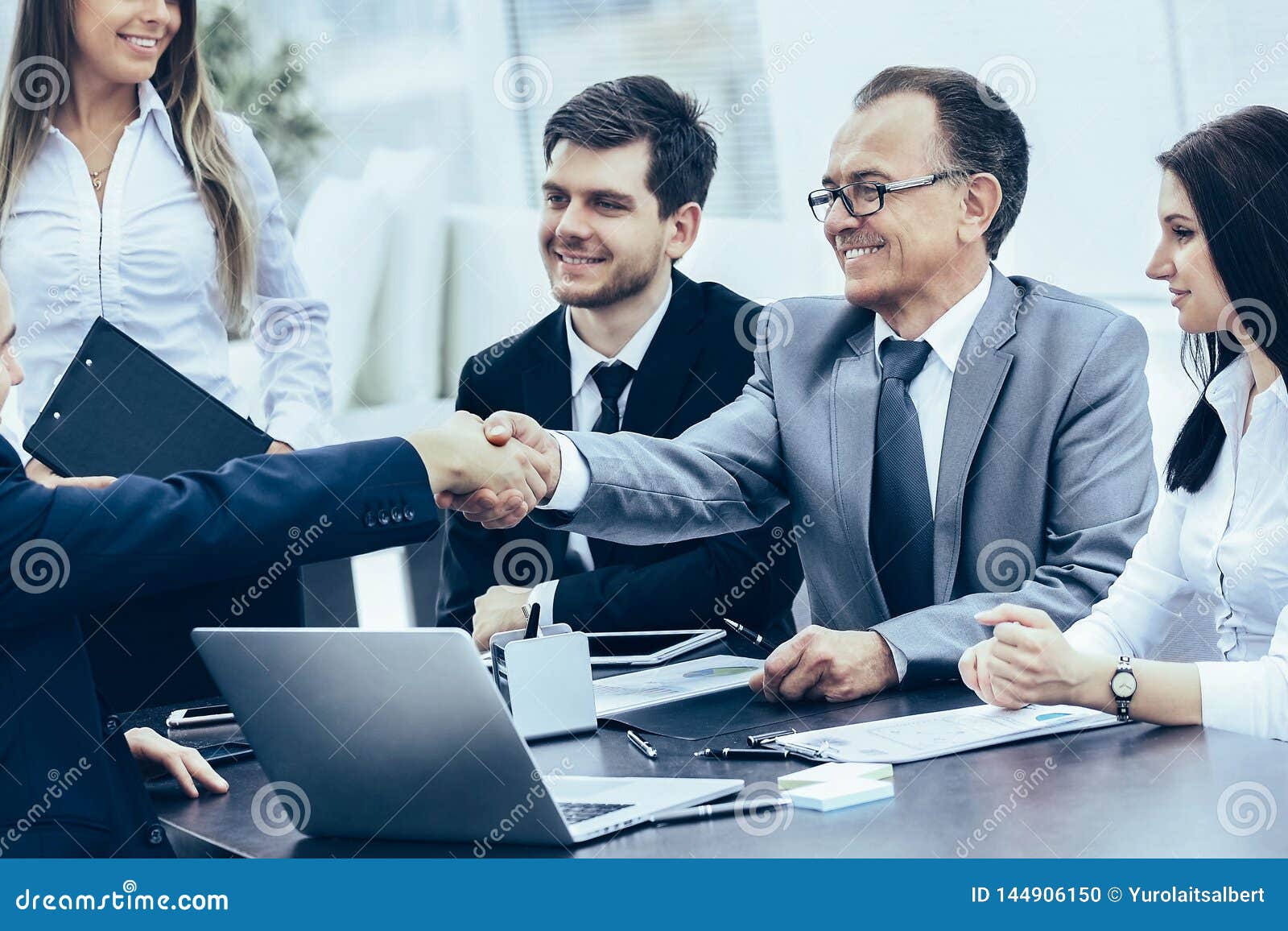 Business Meeting the Table and Handshake of Business Partners Stock ...