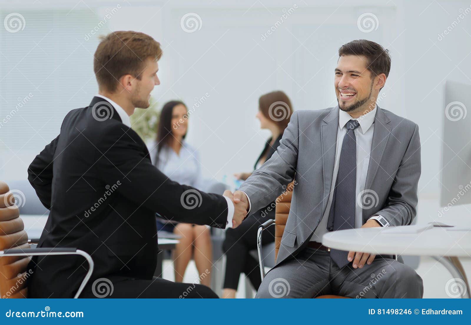 Business Meeting at the Table with Handshake Stock Photo - Image of ...