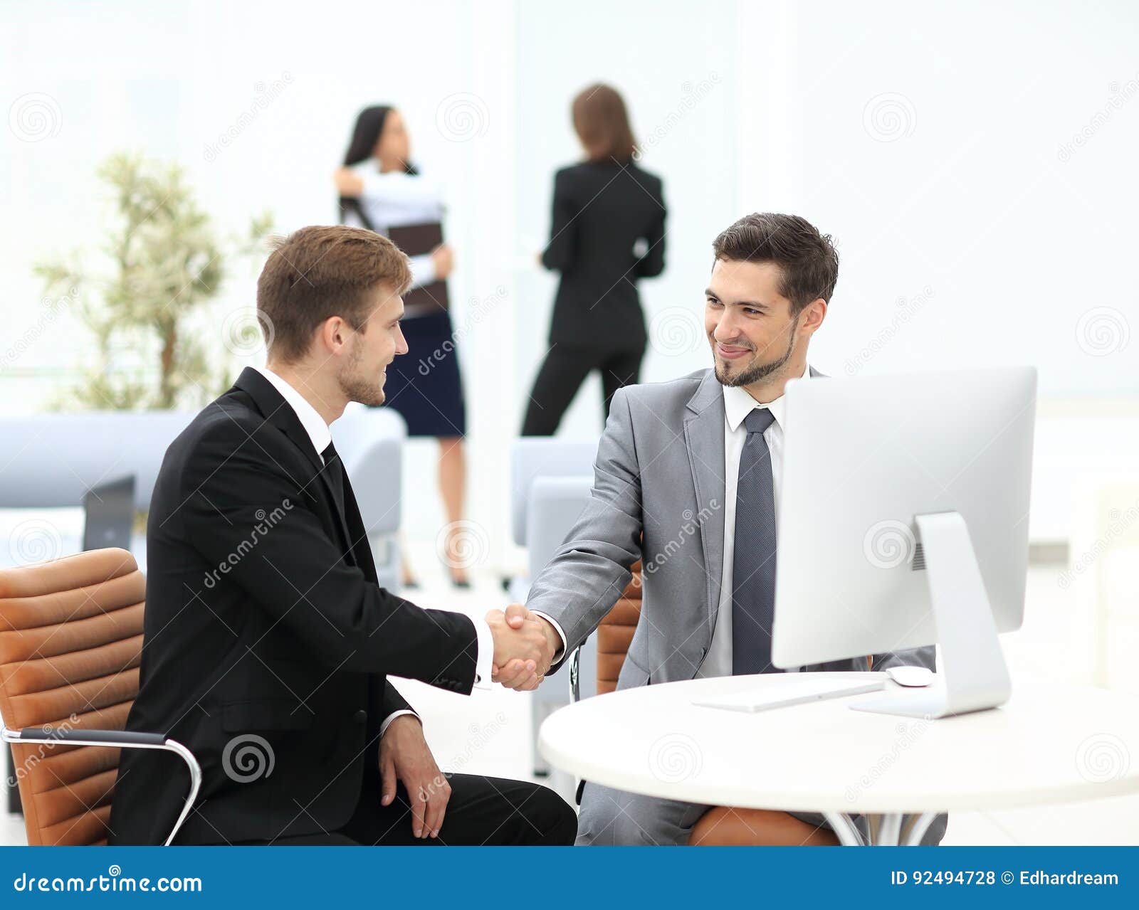 Business Meeting at the Table with Handshake Stock Photo - Image of ...