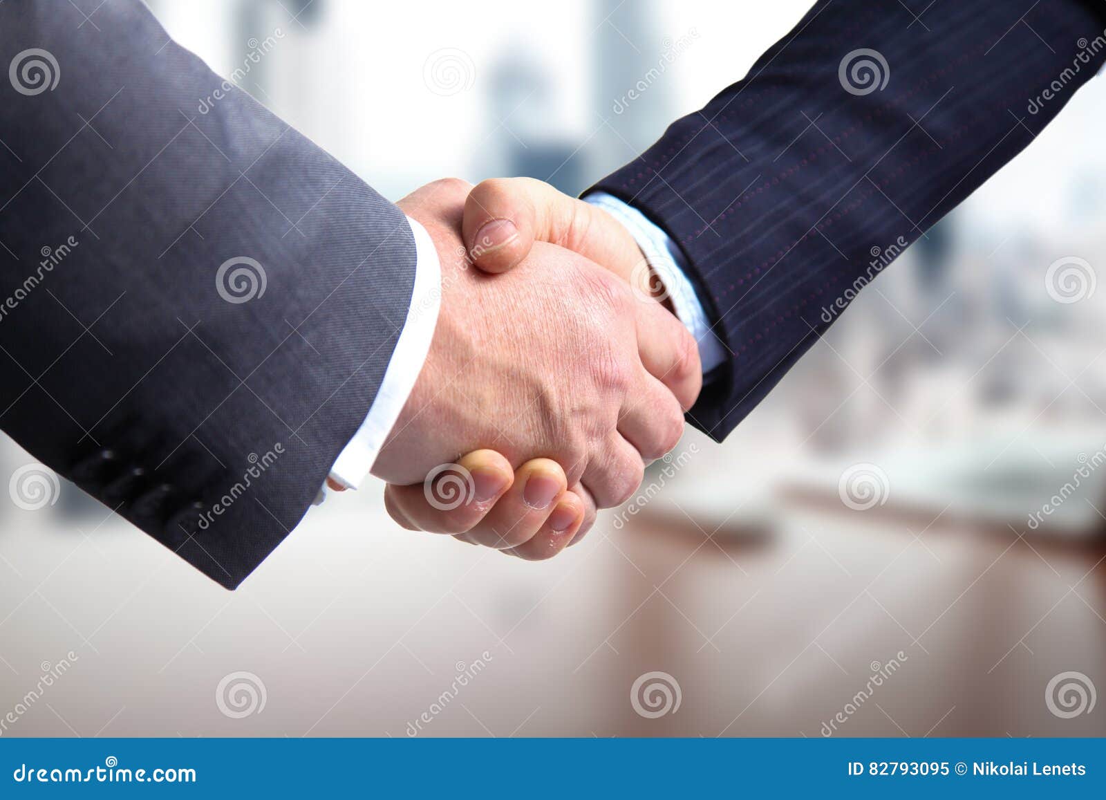 Business Meeting at the Table Shaking Hands Conclusion of the Contract ...