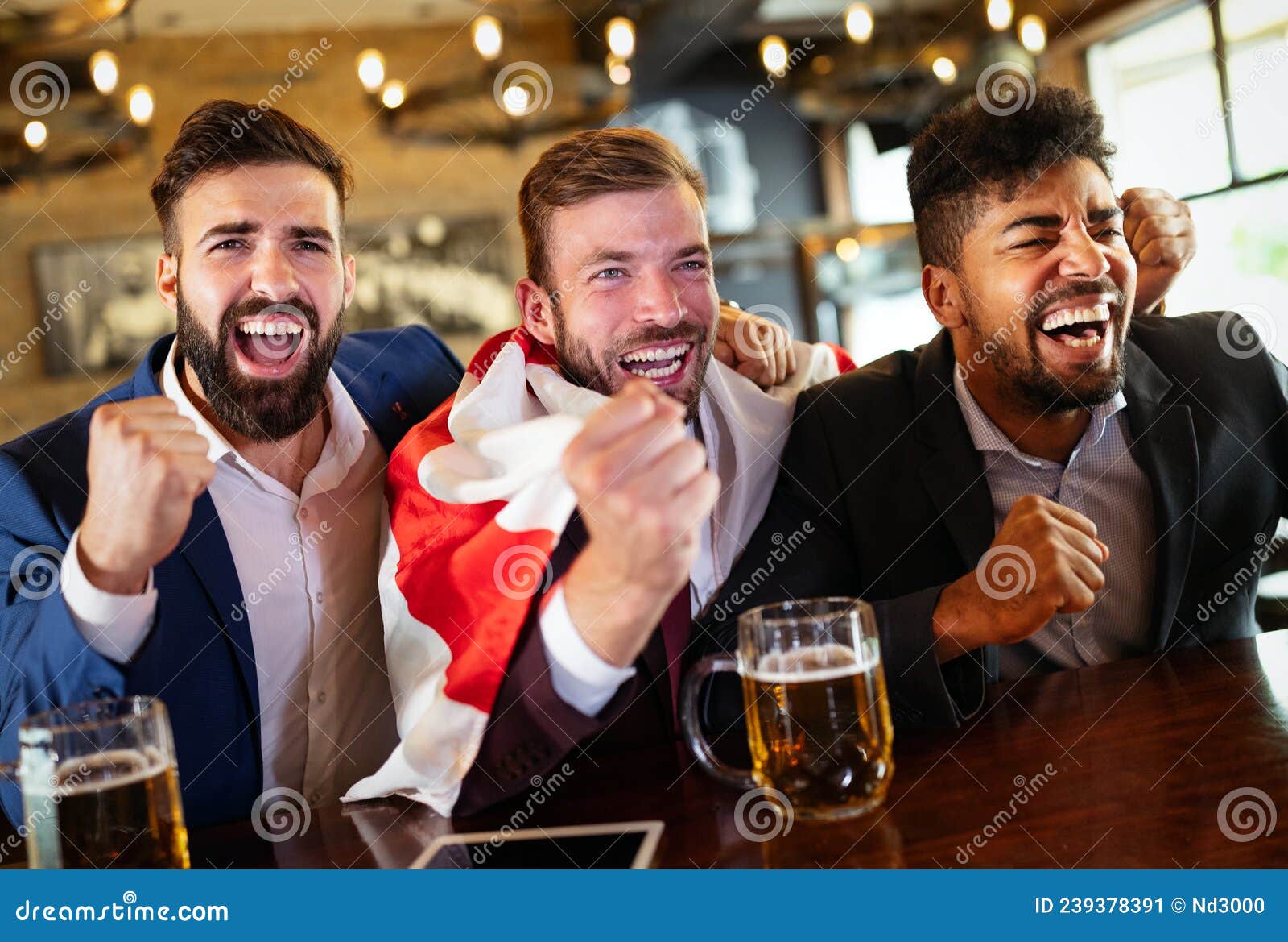 Business Men in Pub Cheering for a Sporting Event Stock Image - Image ...