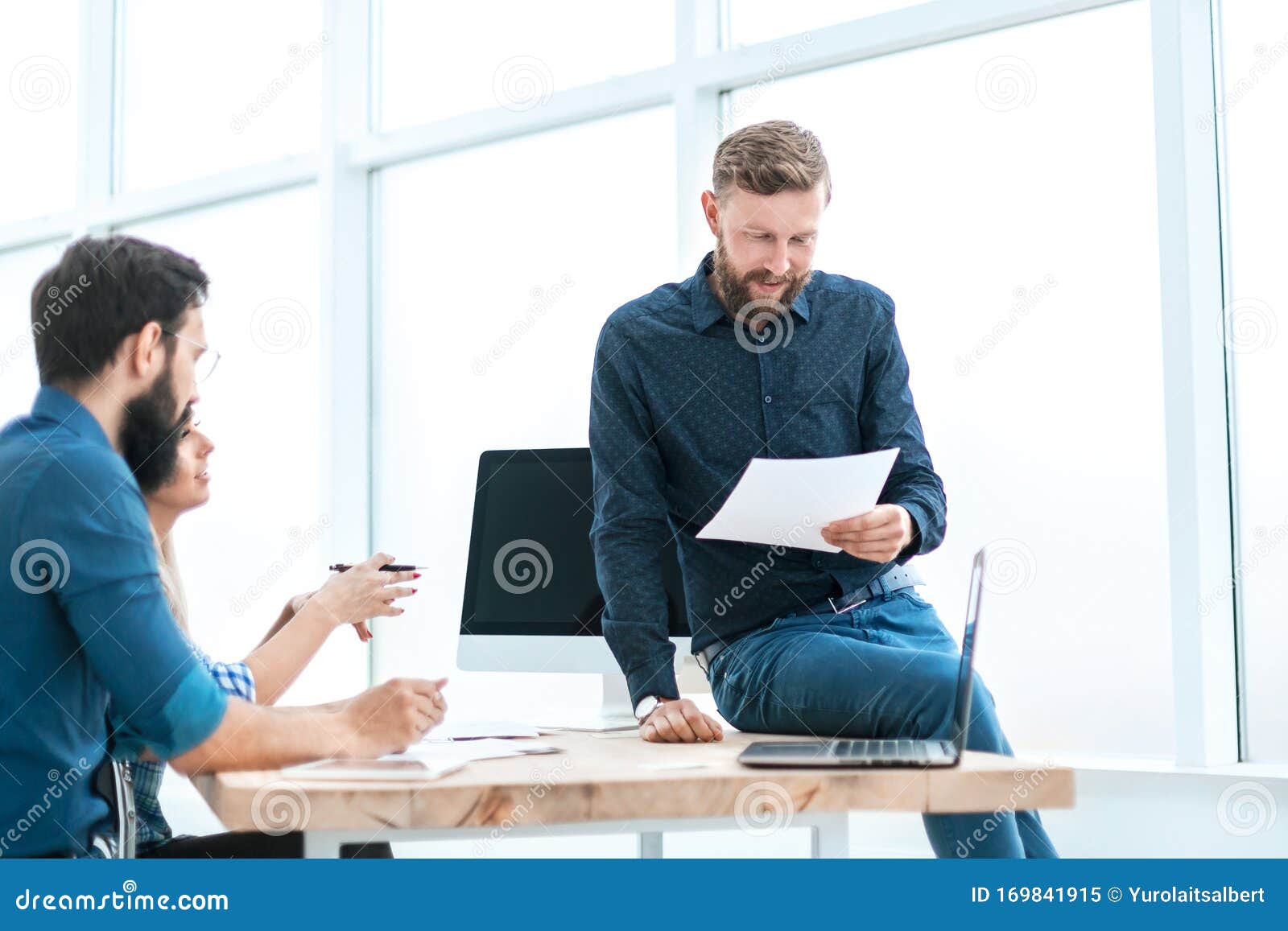 Business Man Reading a Document Sitting on the Table. Stock Image ...