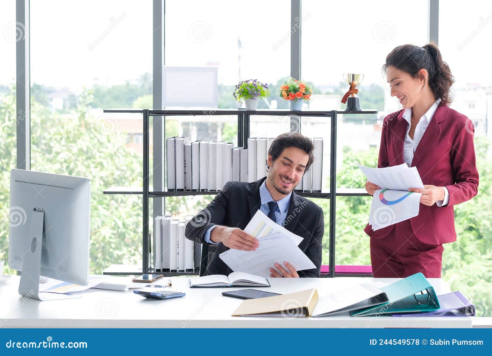 Business Men and Women Collecting Documents in Office Stock Photo ...