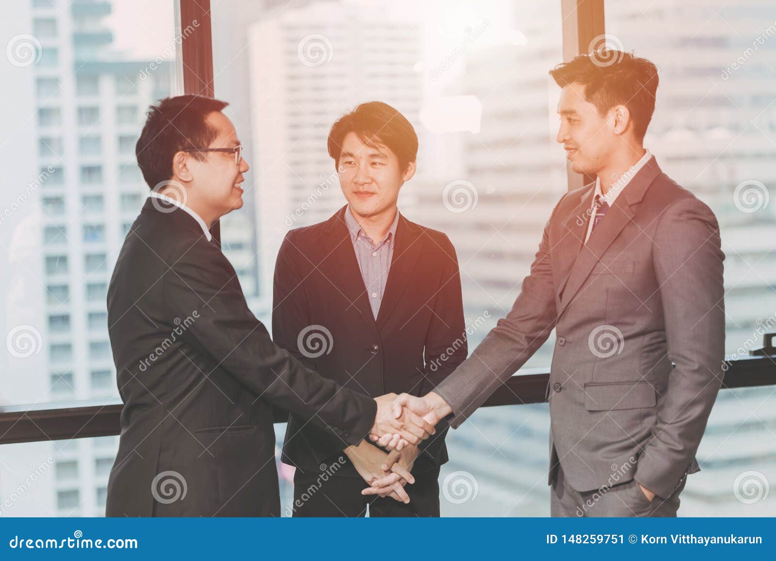 Three Business Man Shake Hands Stock Image - Image of introduce, city ...