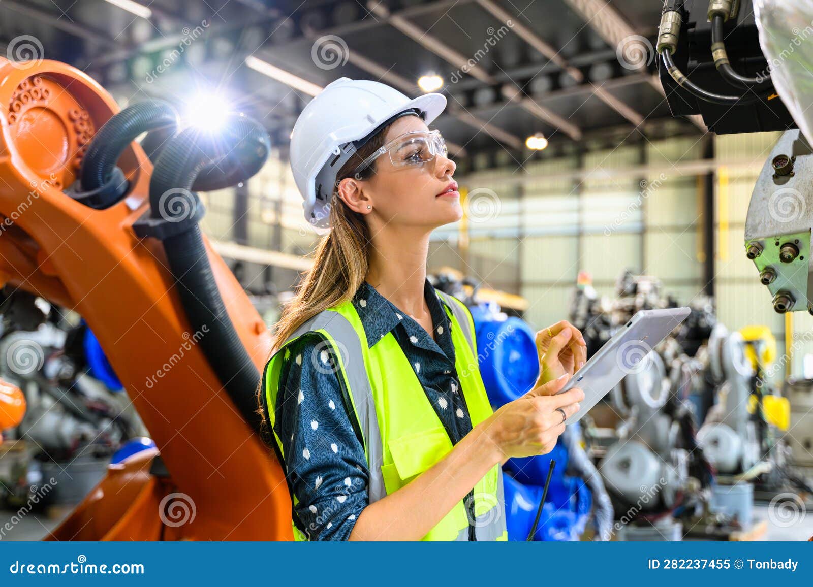 Business Owner Engineer Managing and Checking Work at Factory Stock ...