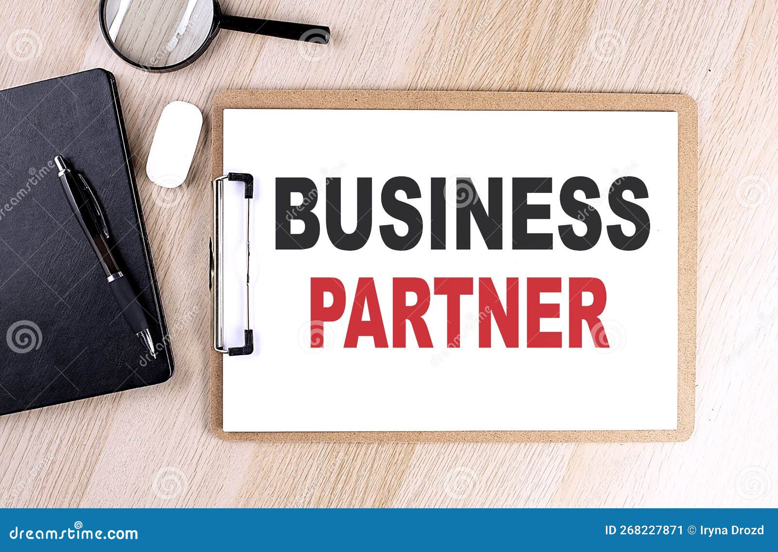 BUSINESS PARTNER Text on Clipboard on Wooden Background Stock Image ...