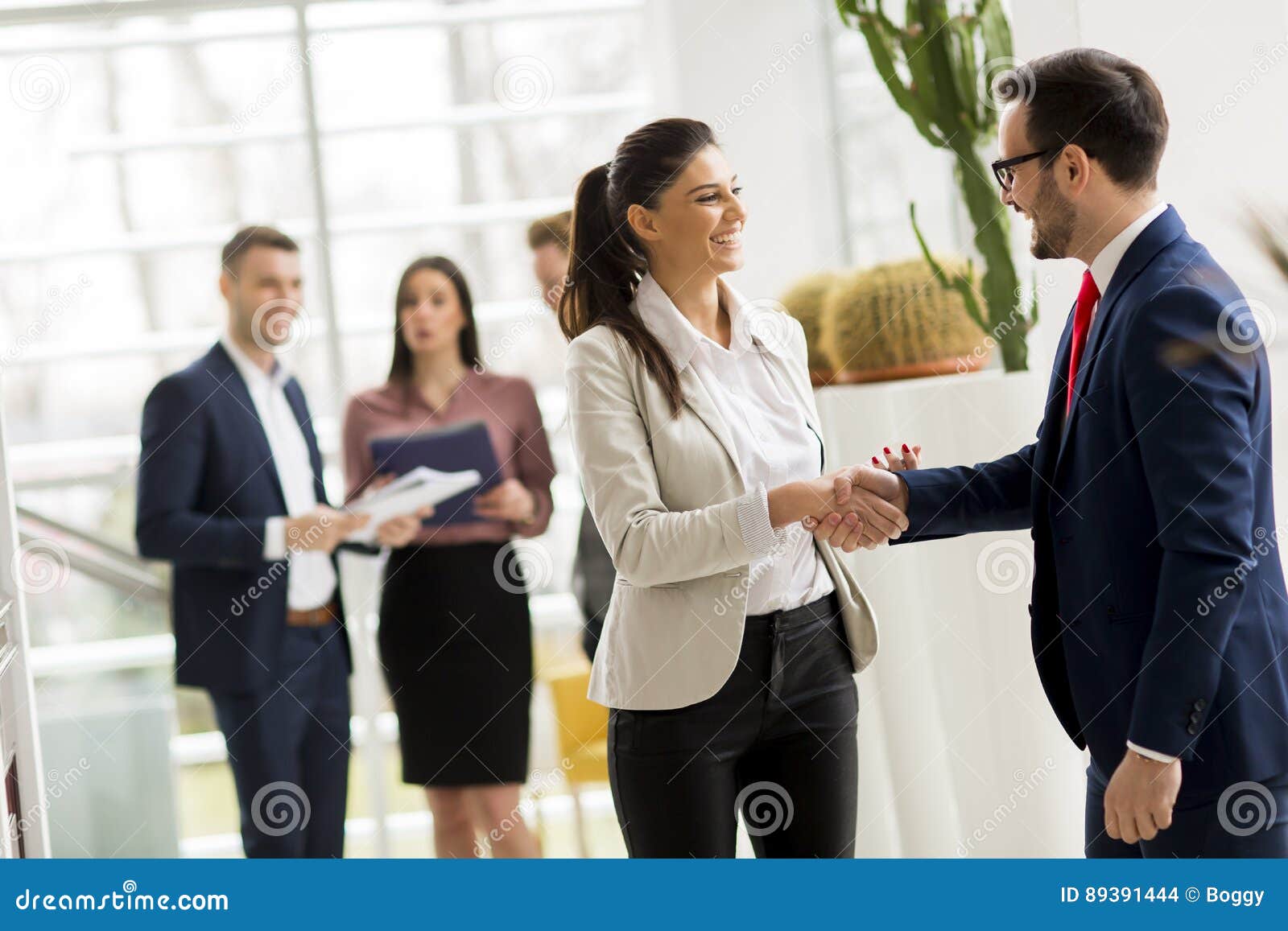 Business Partners Analyze the Business Results in Modern Office Stock ...