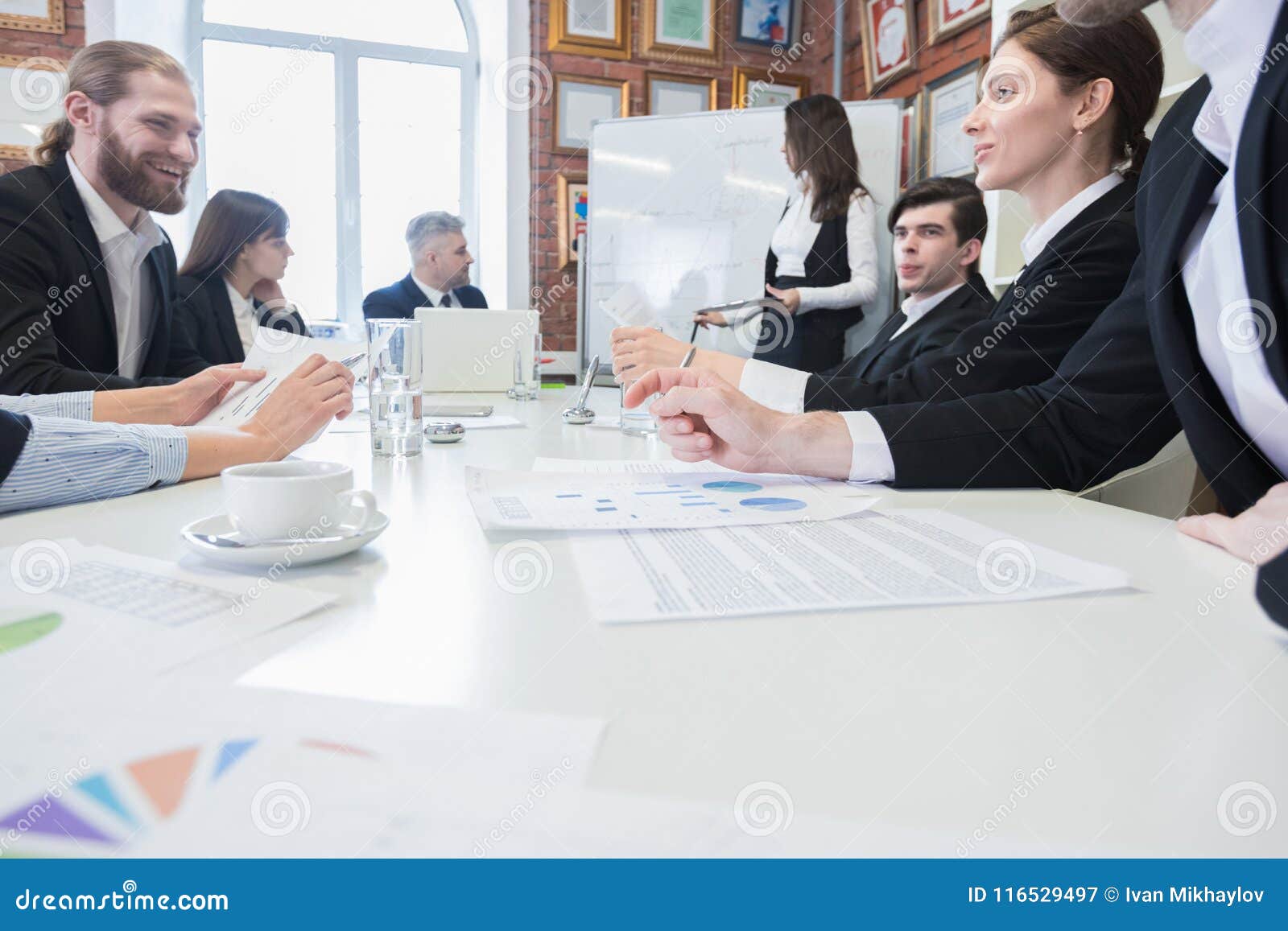 Business Partners Discussing Documents Stock Image - Image of chart ...