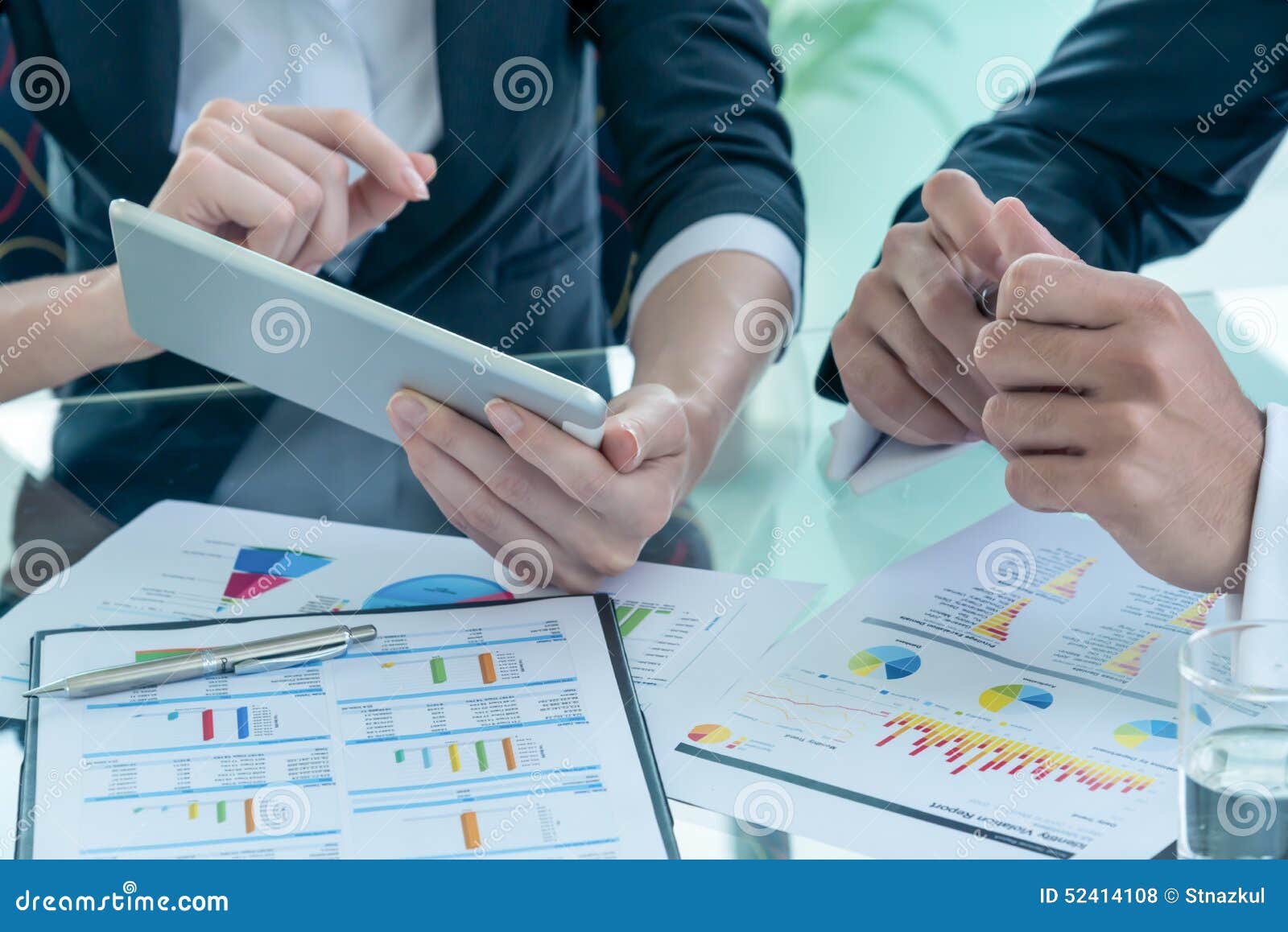 Business Partners Discussing Documents and Ideas Stock Photo - Image of ...