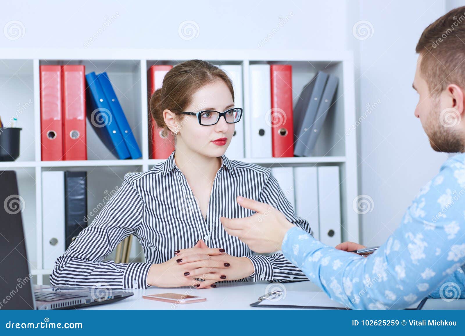 Business Partners Discussing Documents and Ideas at Meeting. Teamwork ...