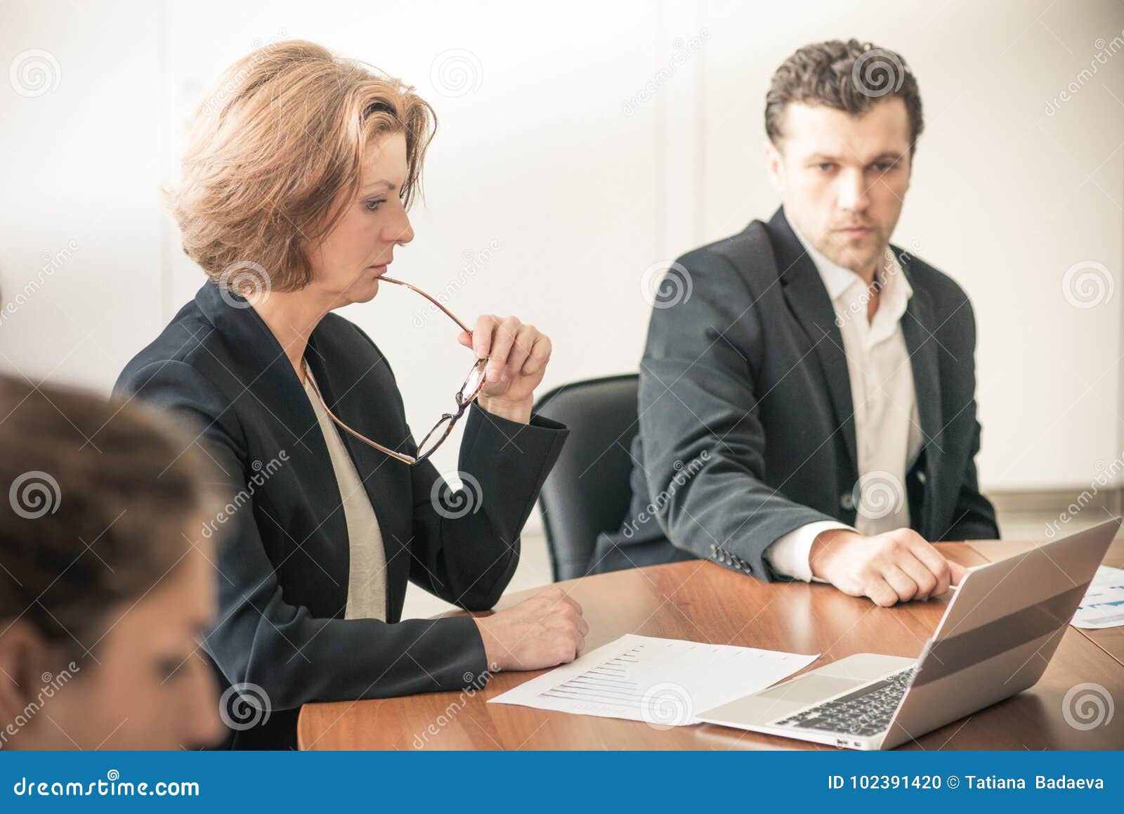 Business Partners Discussing Documents Stock Photo - Image of ...