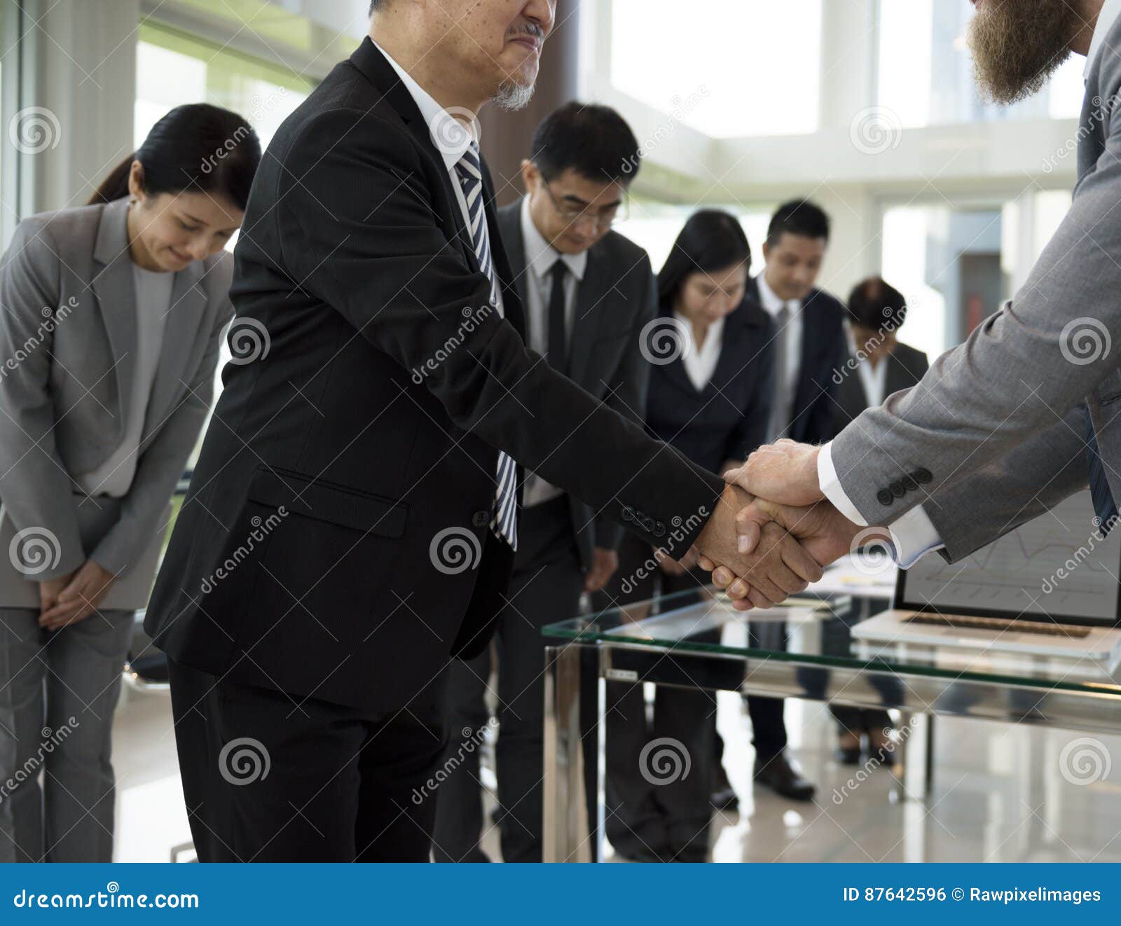 Business Partners Introduction Handshake Bow Concept Stock Photo ...