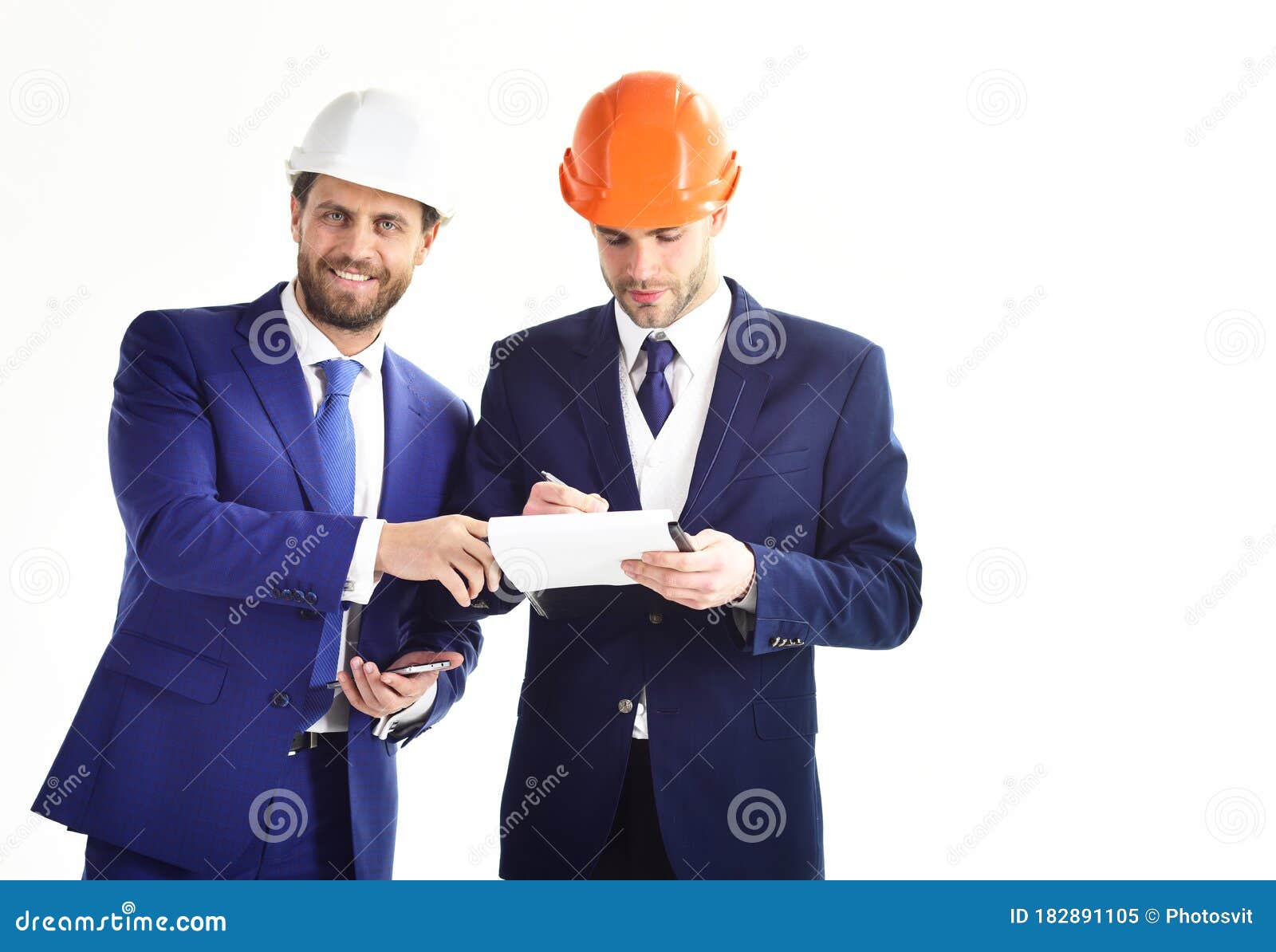 Business Partners Look at Plans. Engineers with Happy Faces Stock Image ...