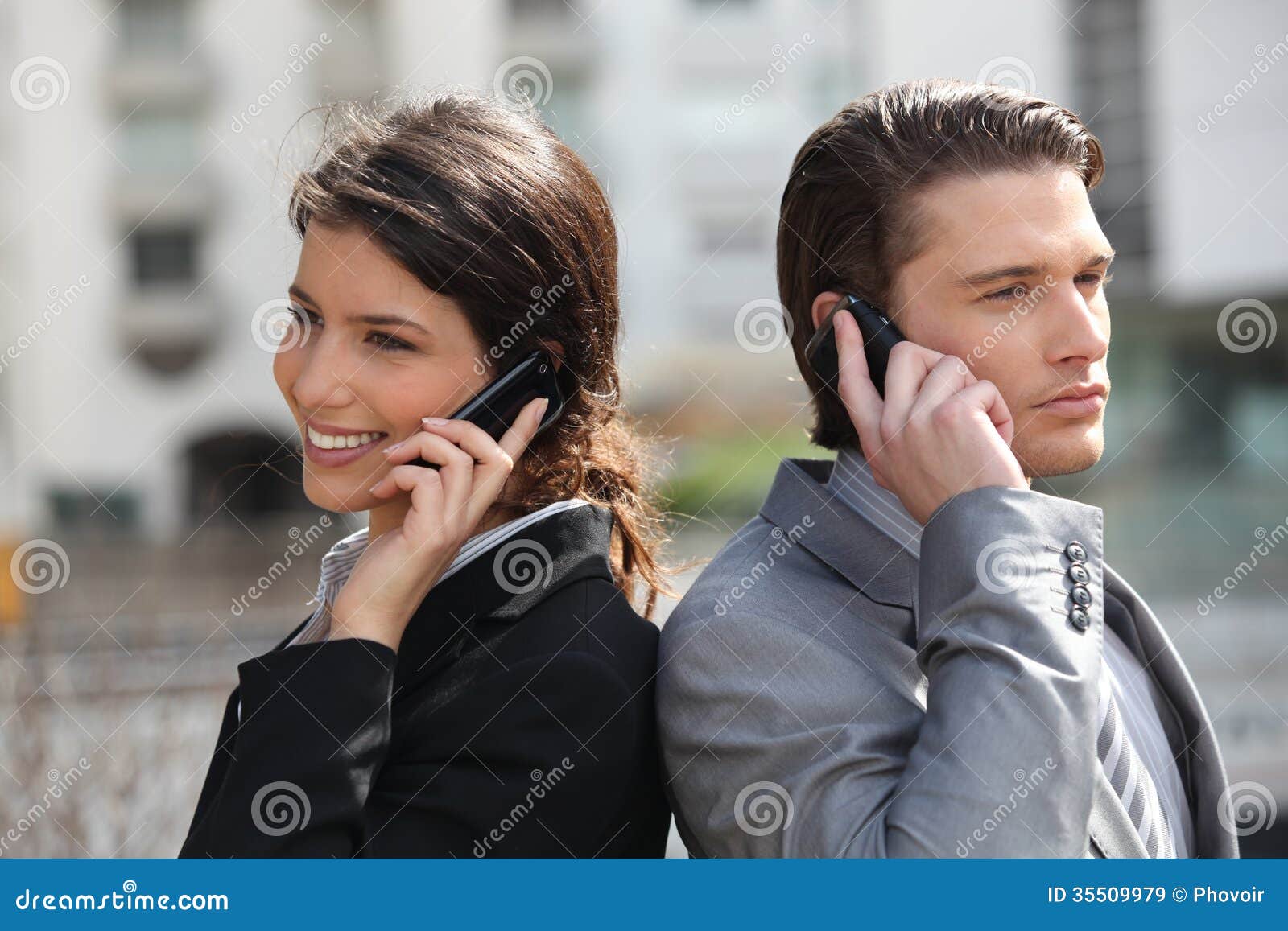 Business Partners Making Calls Stock Image - Image of office, colleague ...