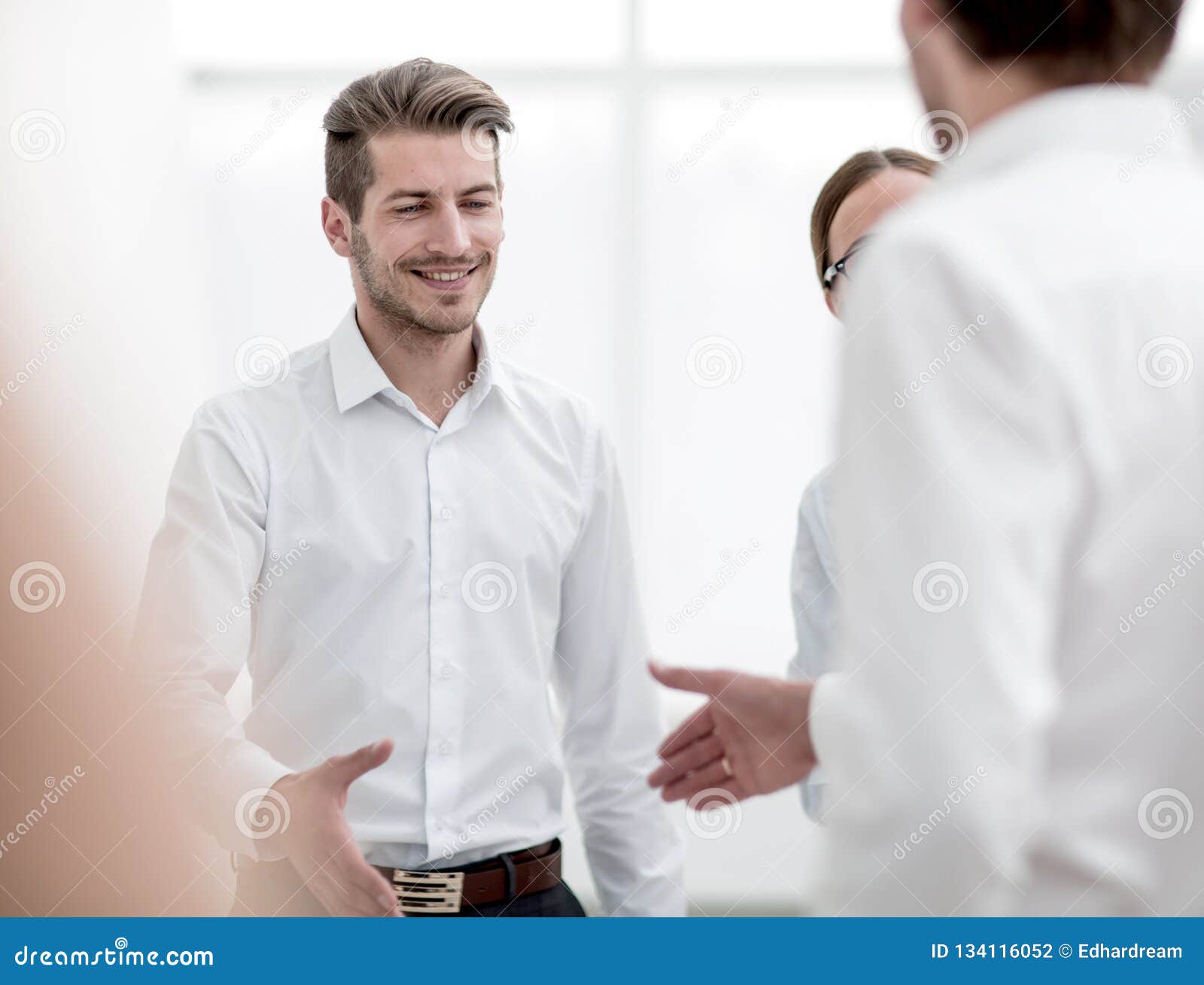 Business Partners Reaching Out for a Handshake Stock Photo - Image of ...