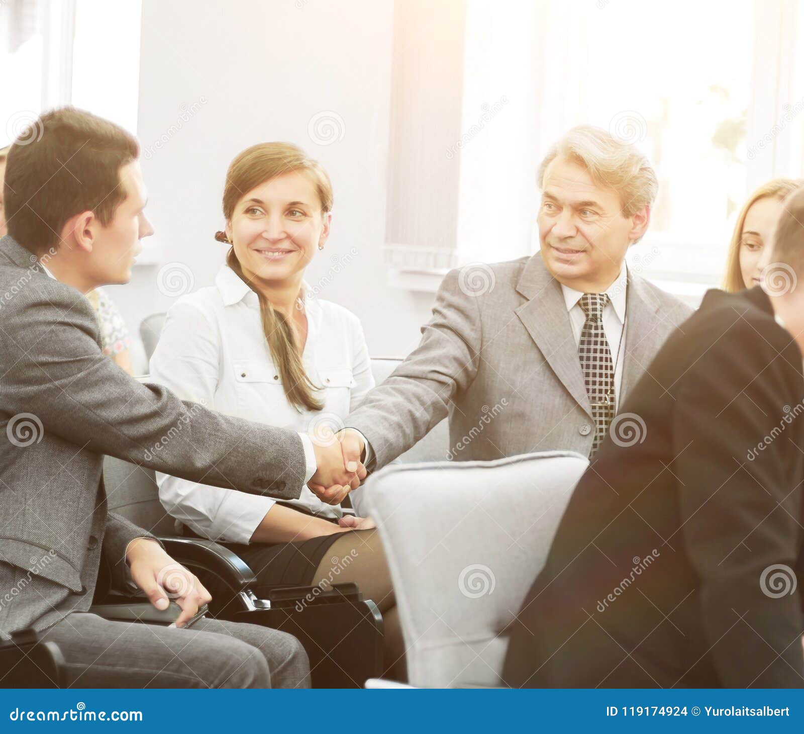 Business Partners Shake Hands in the Conference Room Stock Photo ...
