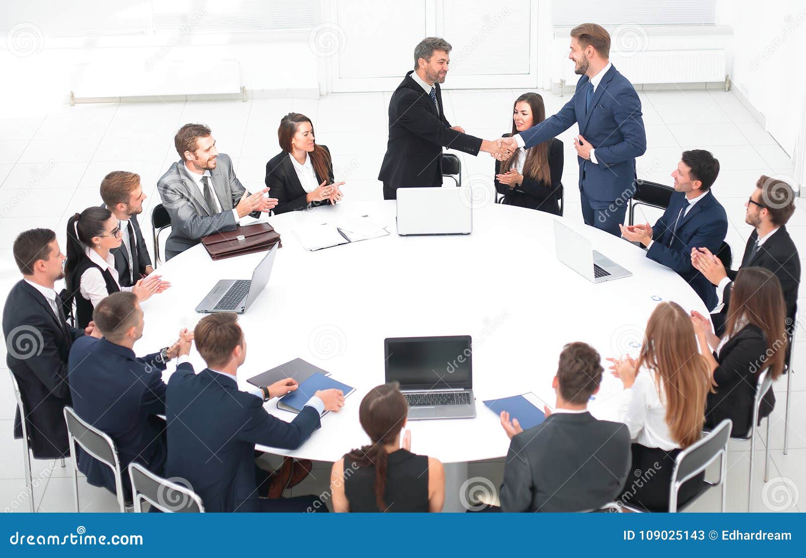 Business Partners Shake Hands at the Talks Near the Round Table Stock ...