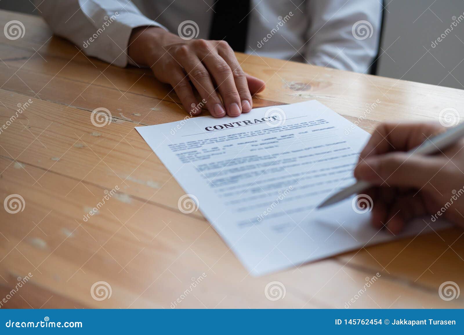 Business Partners Signing a Contract Stock Photo - Image of closeup ...