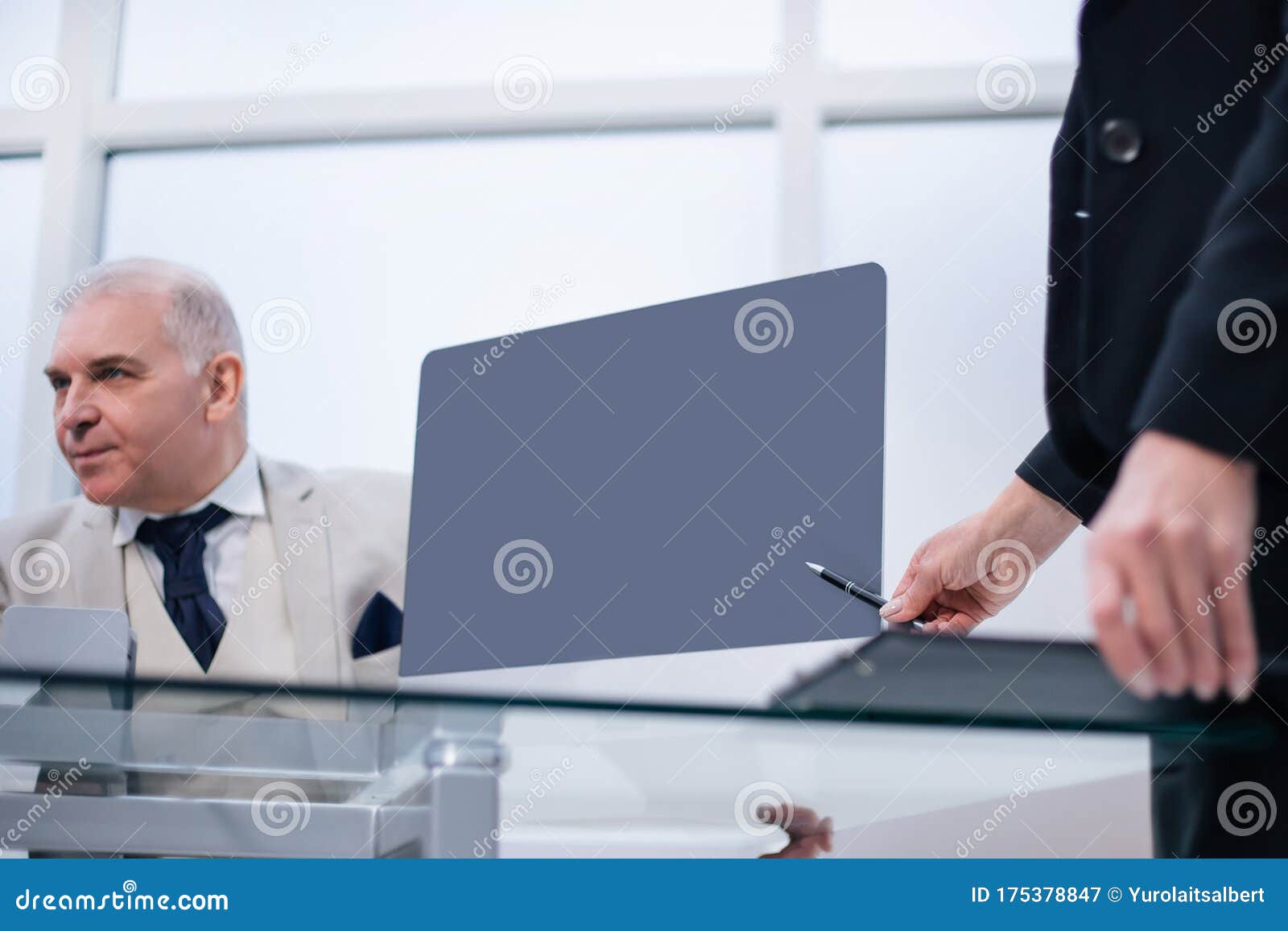 Business Partners Sitting at the Negotiating Table Stock Image - Image ...