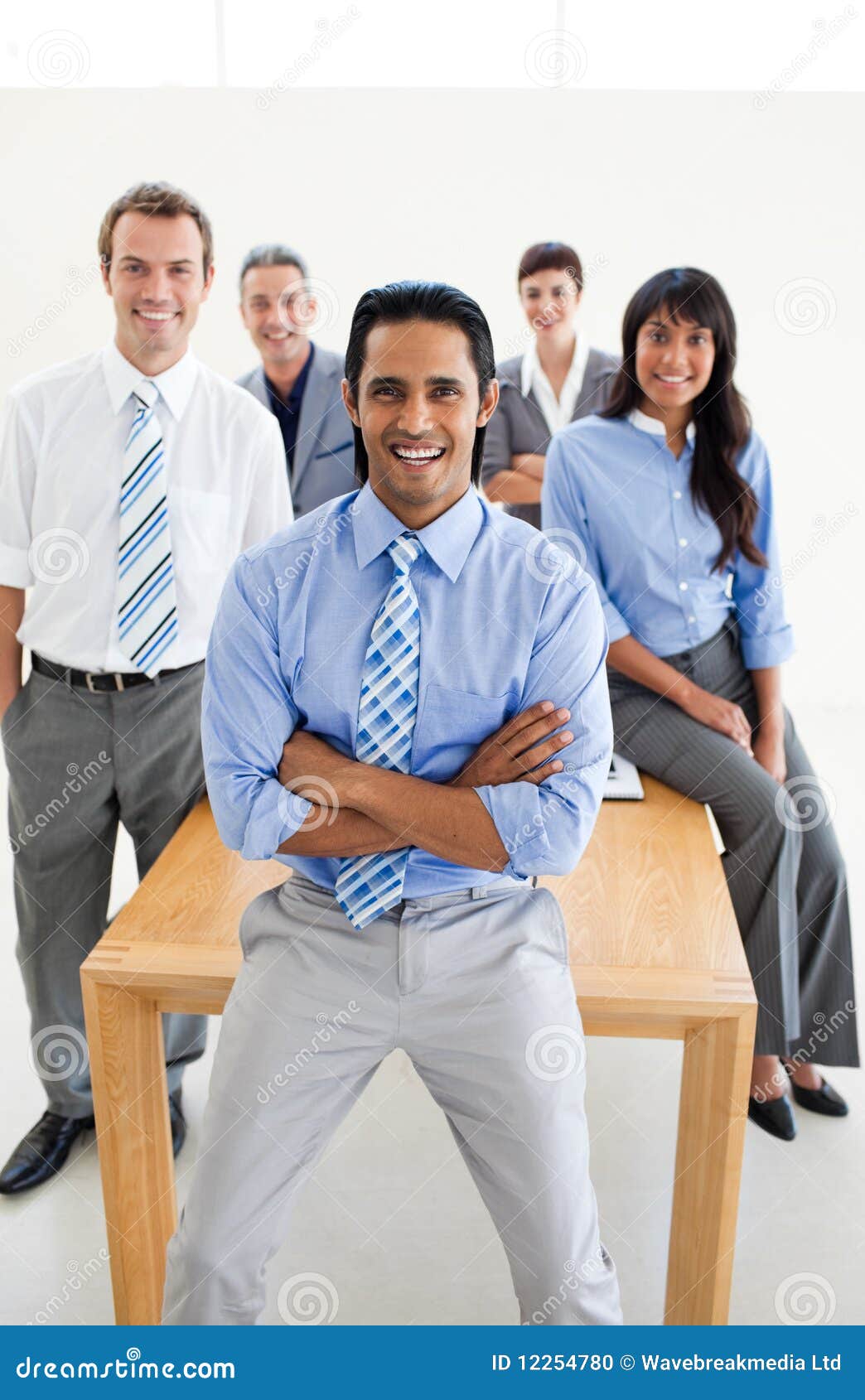 Business Partners Standing Around a Table Stock Photo - Image of male ...