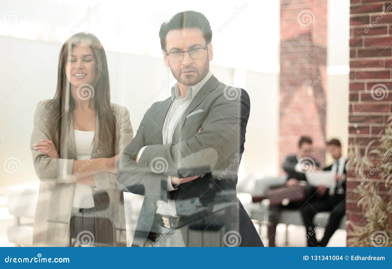 Business Partners Standing in a Modern Office Stock Photo - Image of ...