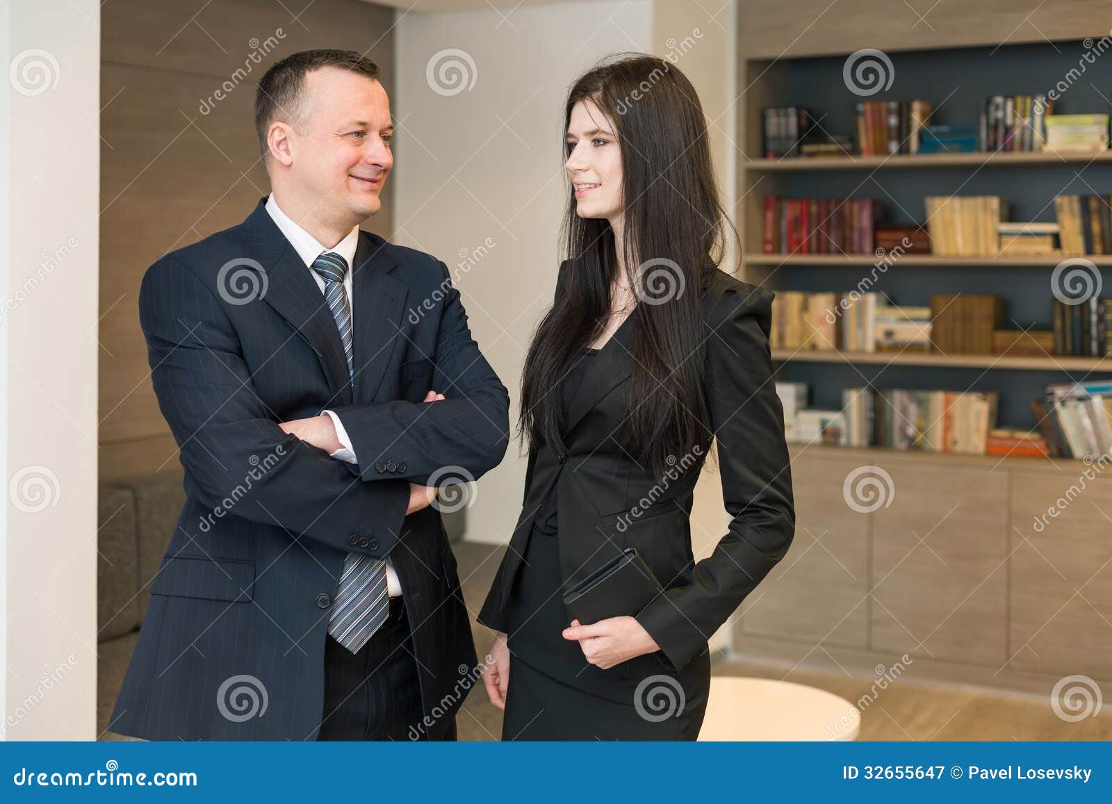 Business Partners in Suits Standing in the Room Stock Image - Image of ...