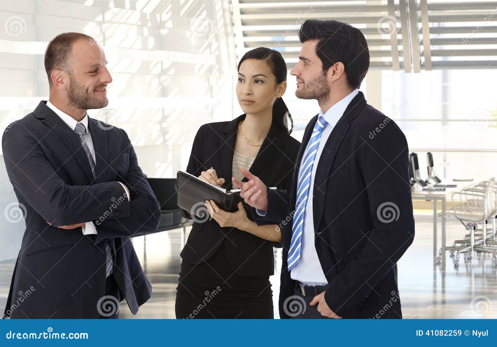 Business Partners Talking at Office Stock Image - Image of chatting ...