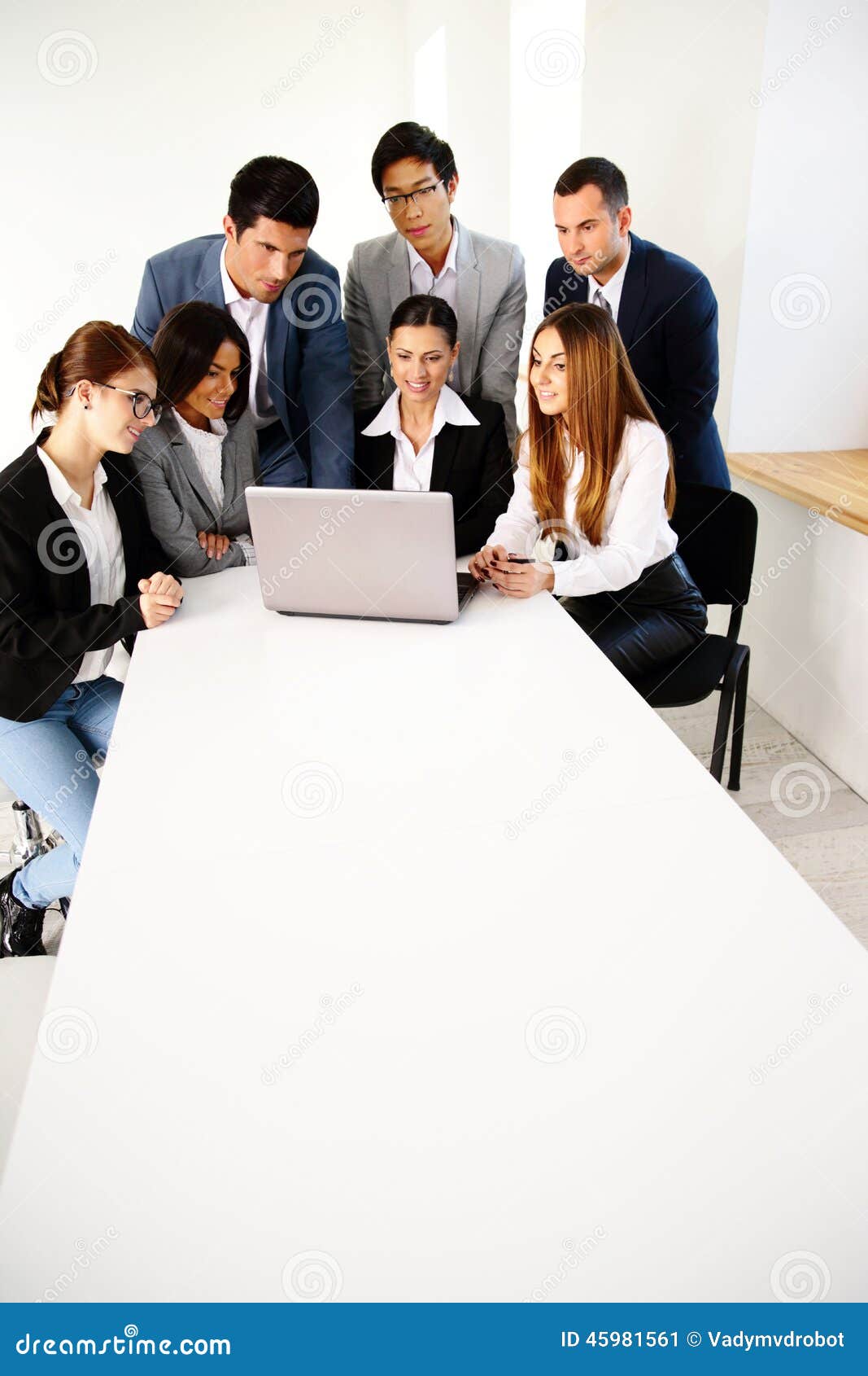 Business Partners Using Laptop Together Stock Image - Image of office ...
