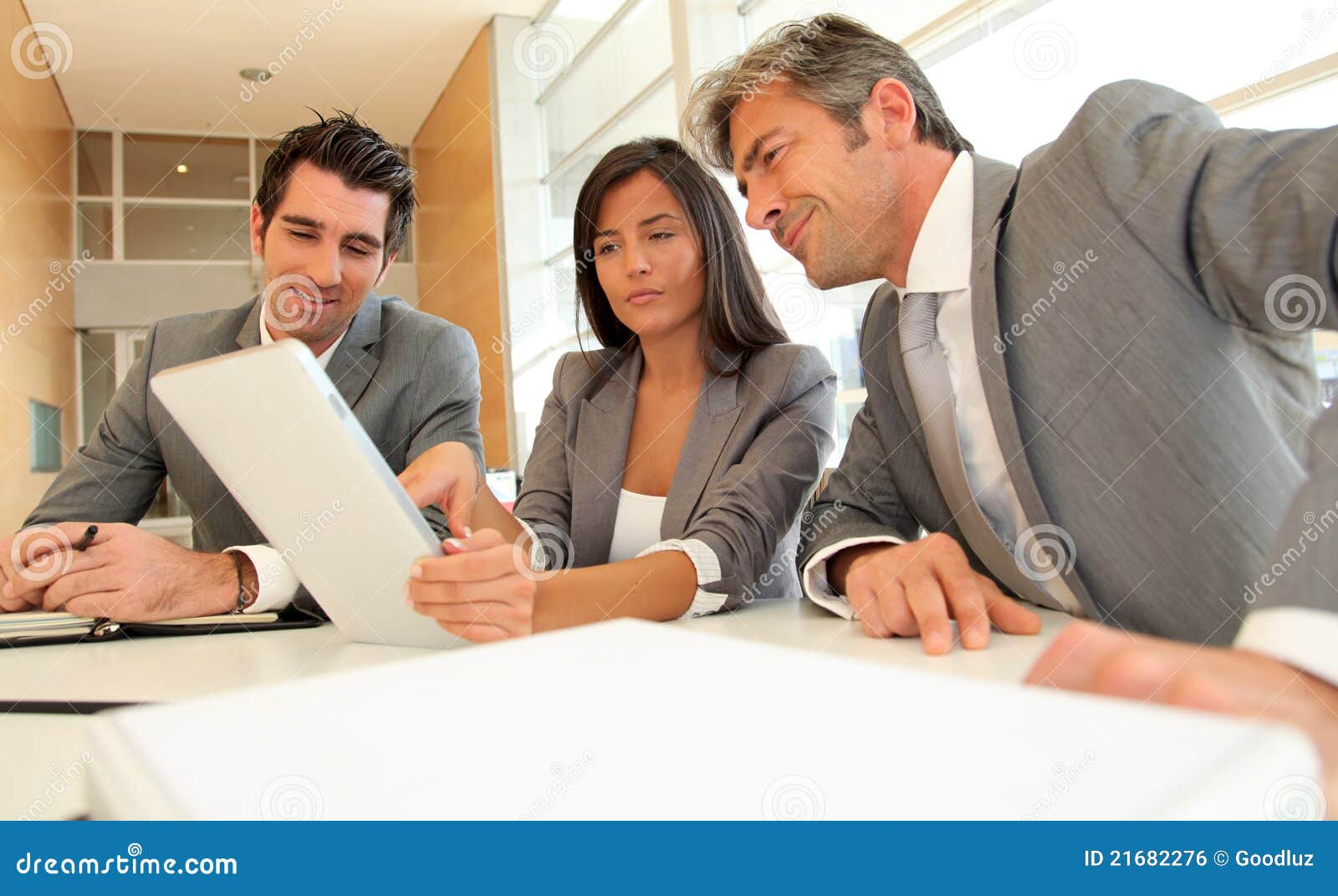 Business partners at work stock photo. Image of office - 21682276