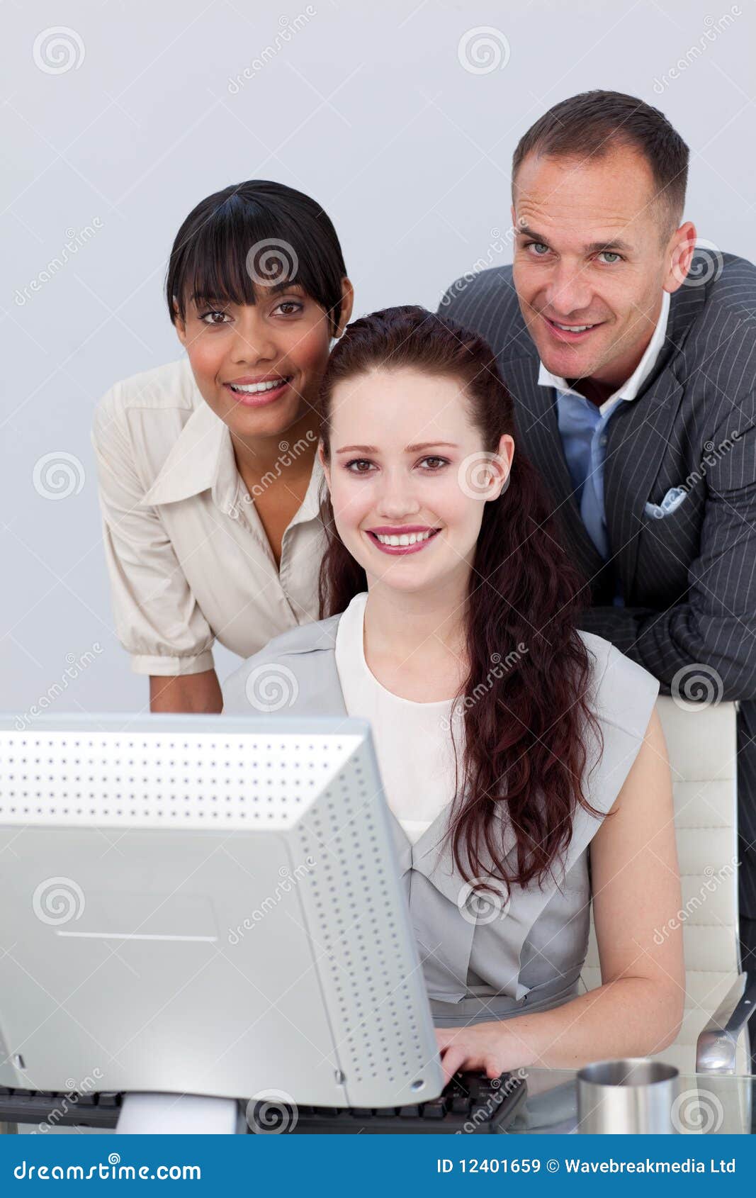 Business Partners Working Together at a Computer Stock Image - Image of ...
