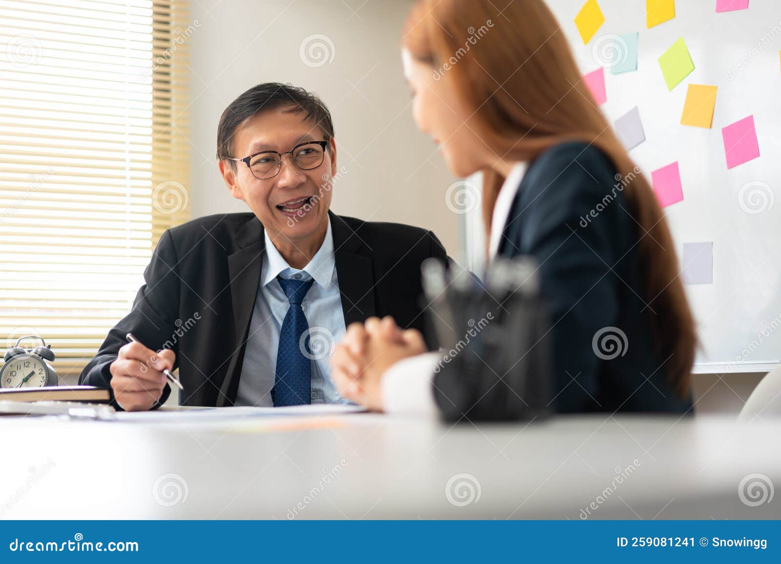 Business Partnership Concept, Senior in Business is Explaining and ...
