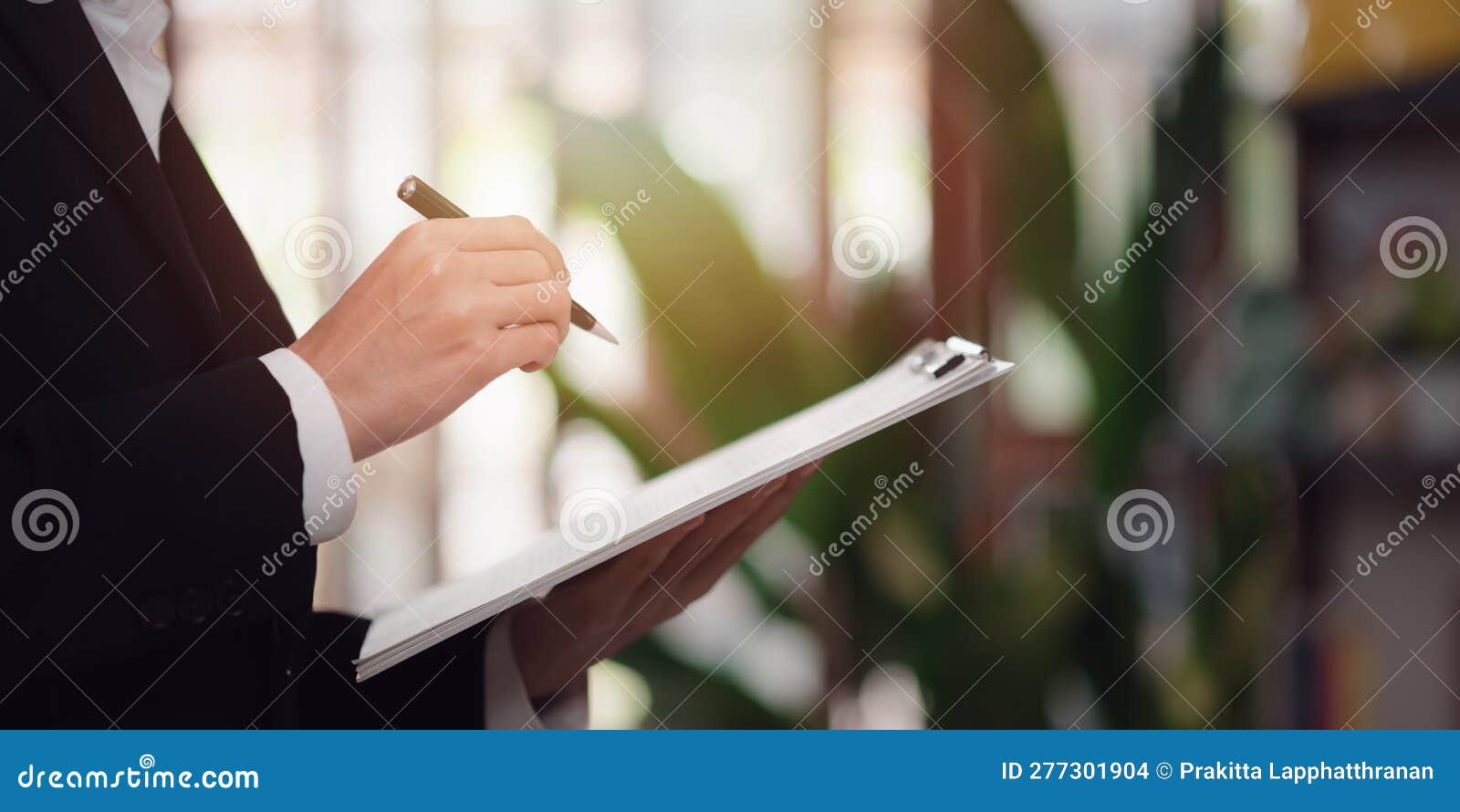 Business People Analyzing Market Data Reports and Check the Documents ...