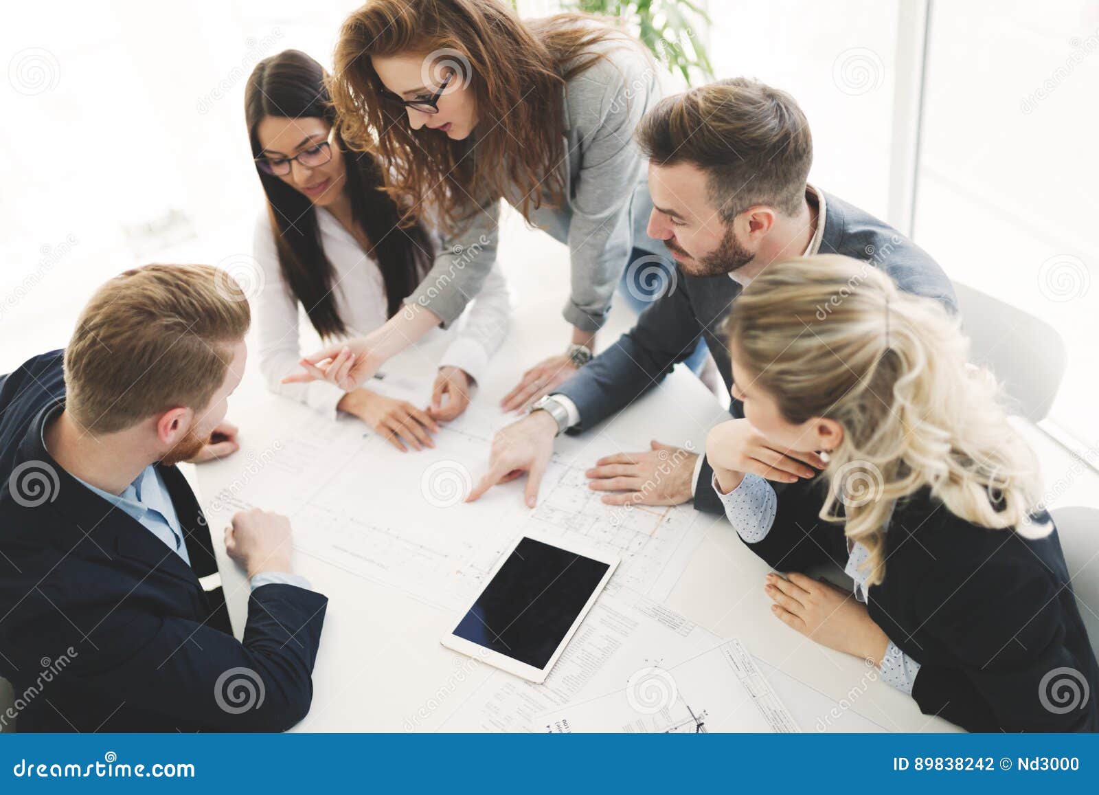 Business People and Architects Collaborating on Project Stock Photo ...