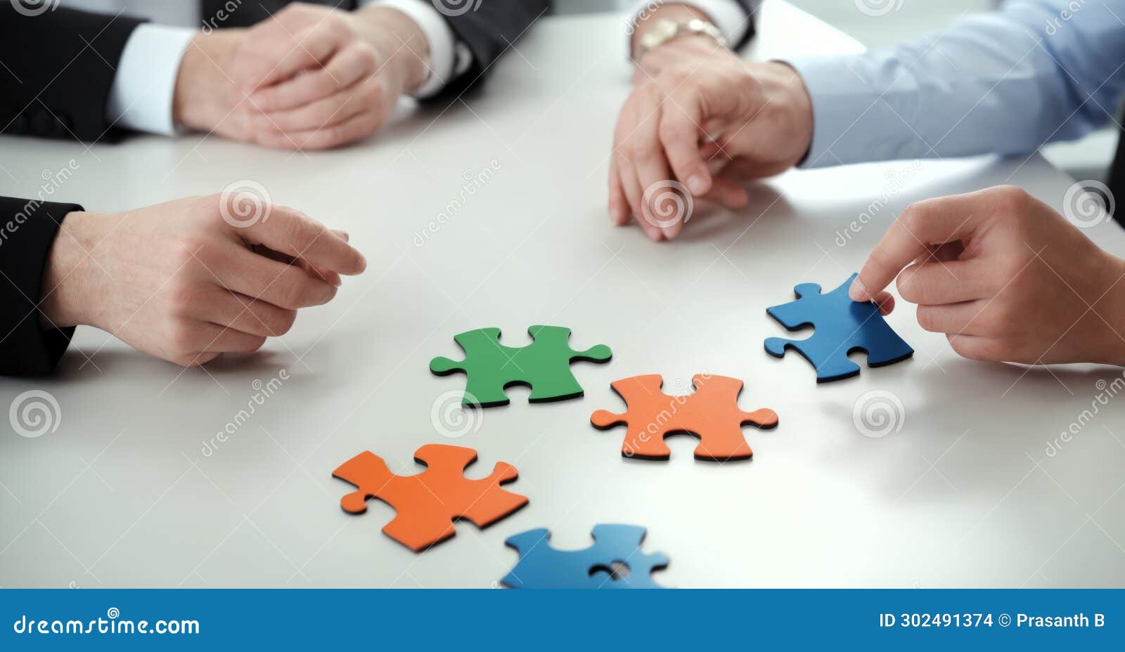 Business People Assembling Jigsaw Puzzle, Closeup. Teamwork Concept ... Business People Assembling Jigsaw Puzzle, Closeup. Teamwork Concept ...