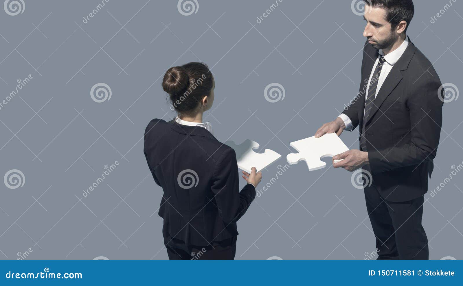 Business People Assembling a Jigsaw Puzzle Stock Image - Image of ...